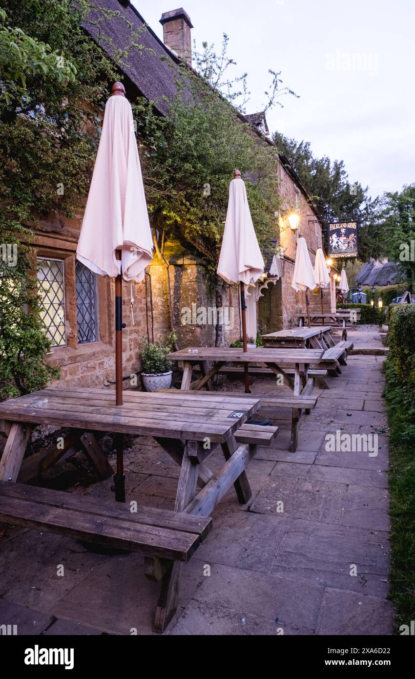 The 'Faulkland Arms' pub in the quintessential Cotswold village of ...