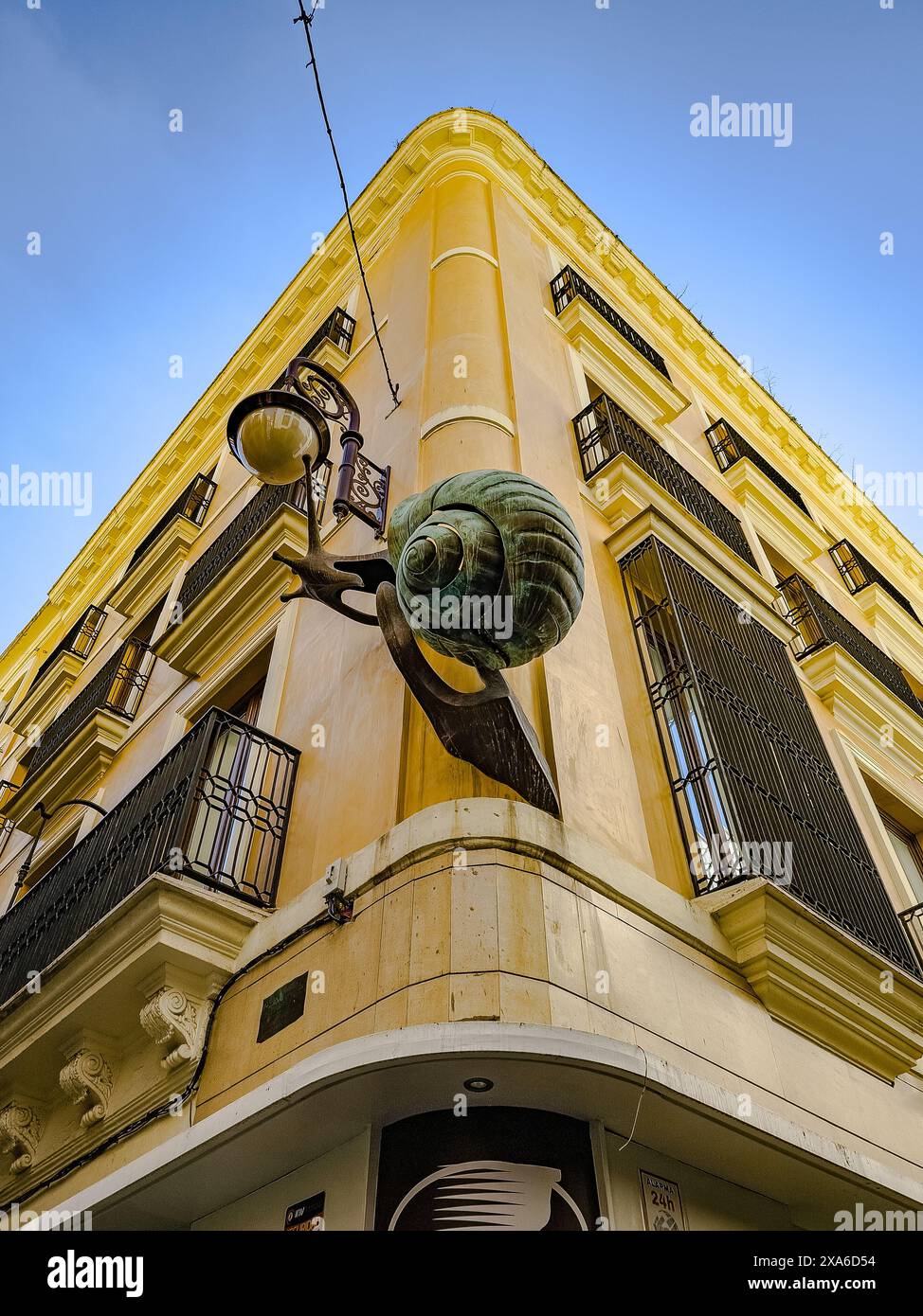 An ornate building under sunlight with detailed architectural features ...