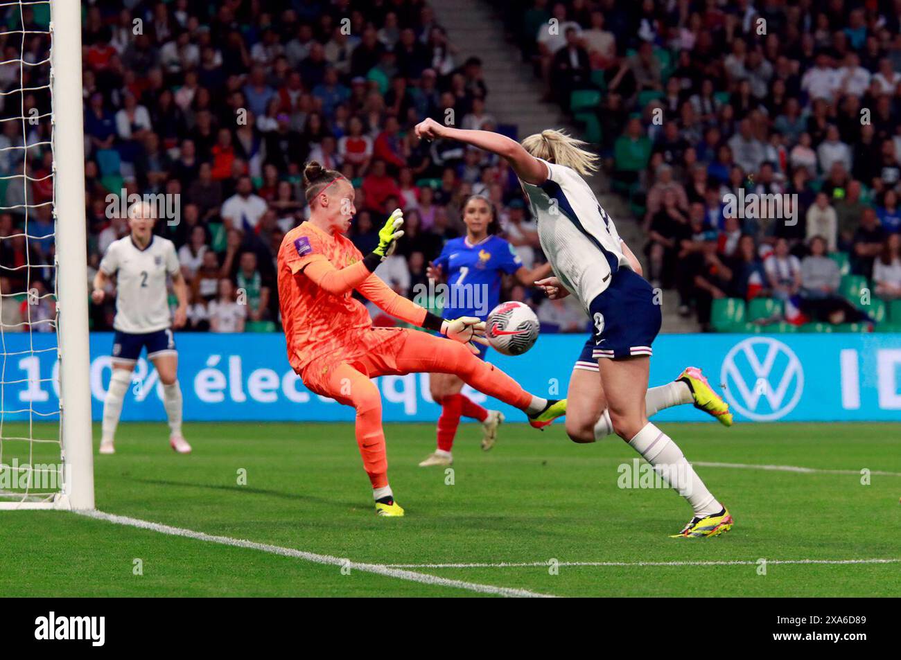 France goalkeeper Pauline Peyraud-Magnin and England's Alessia Russo ...