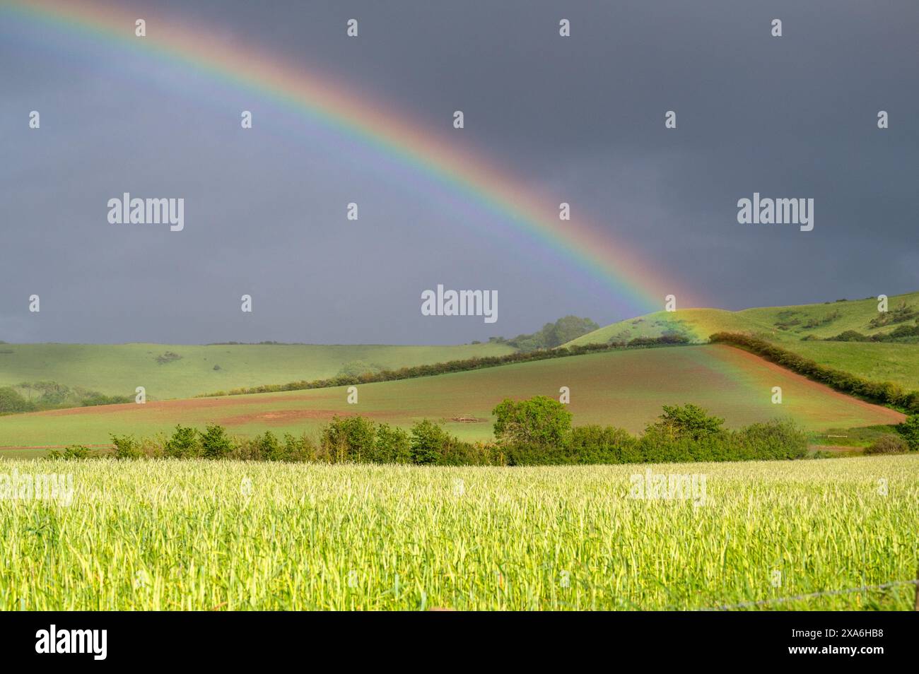 Clouds rain sky field england spring hi-res stock photography and ...