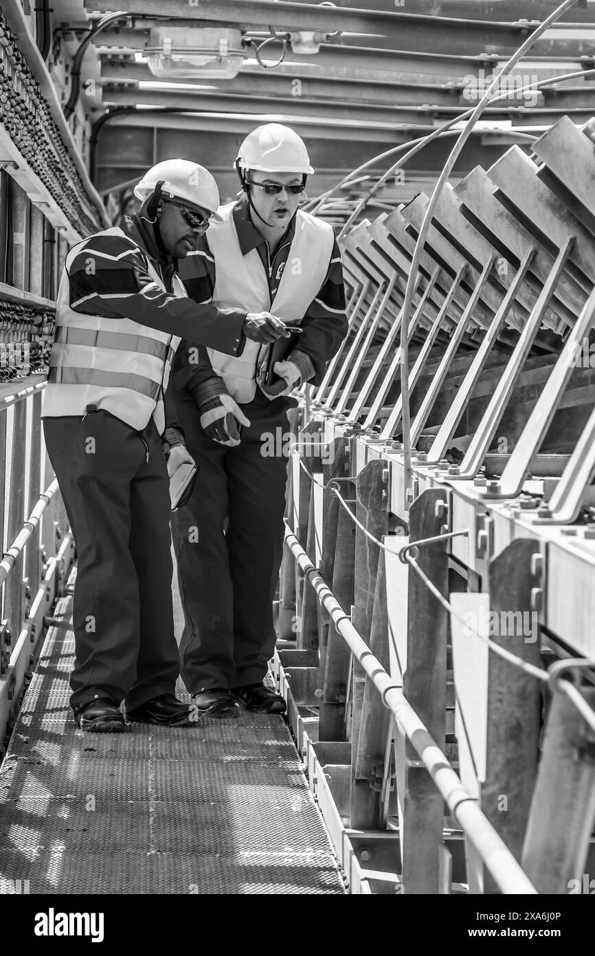 African hard hats Black and White Stock Photos & Images - Alamy