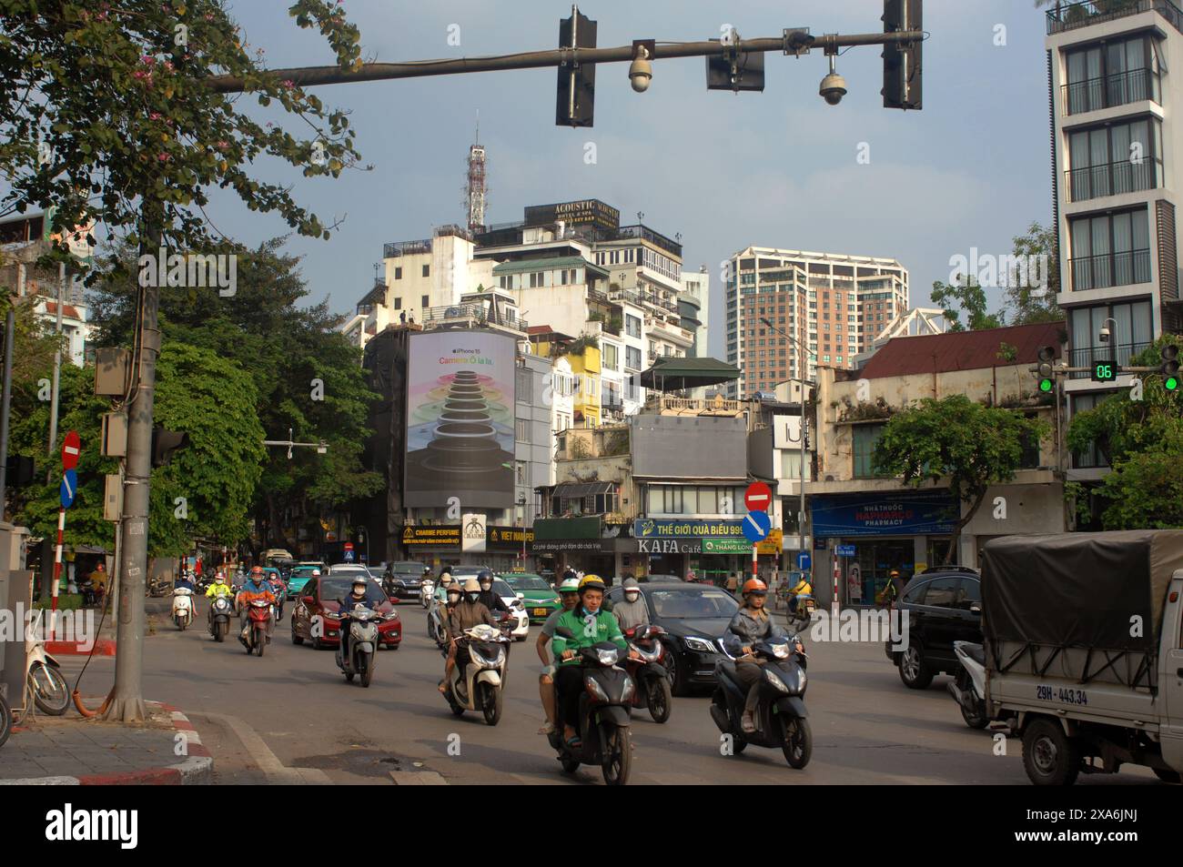 Heavy traffic of scooters and motor bikes on the streets of Hanoi ...