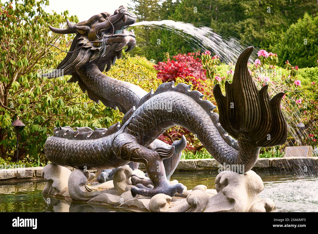 The large bronze dragon fountain sculpture at Butchart Gardens ...