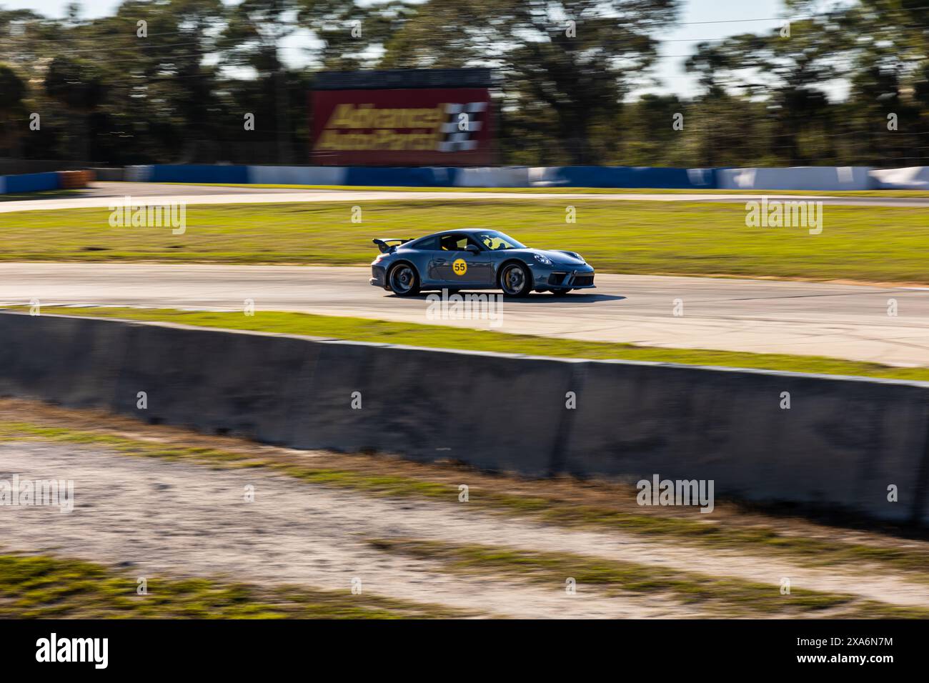 A gray Porsche racing on Sebring track, USA Stock Photo - Alamy