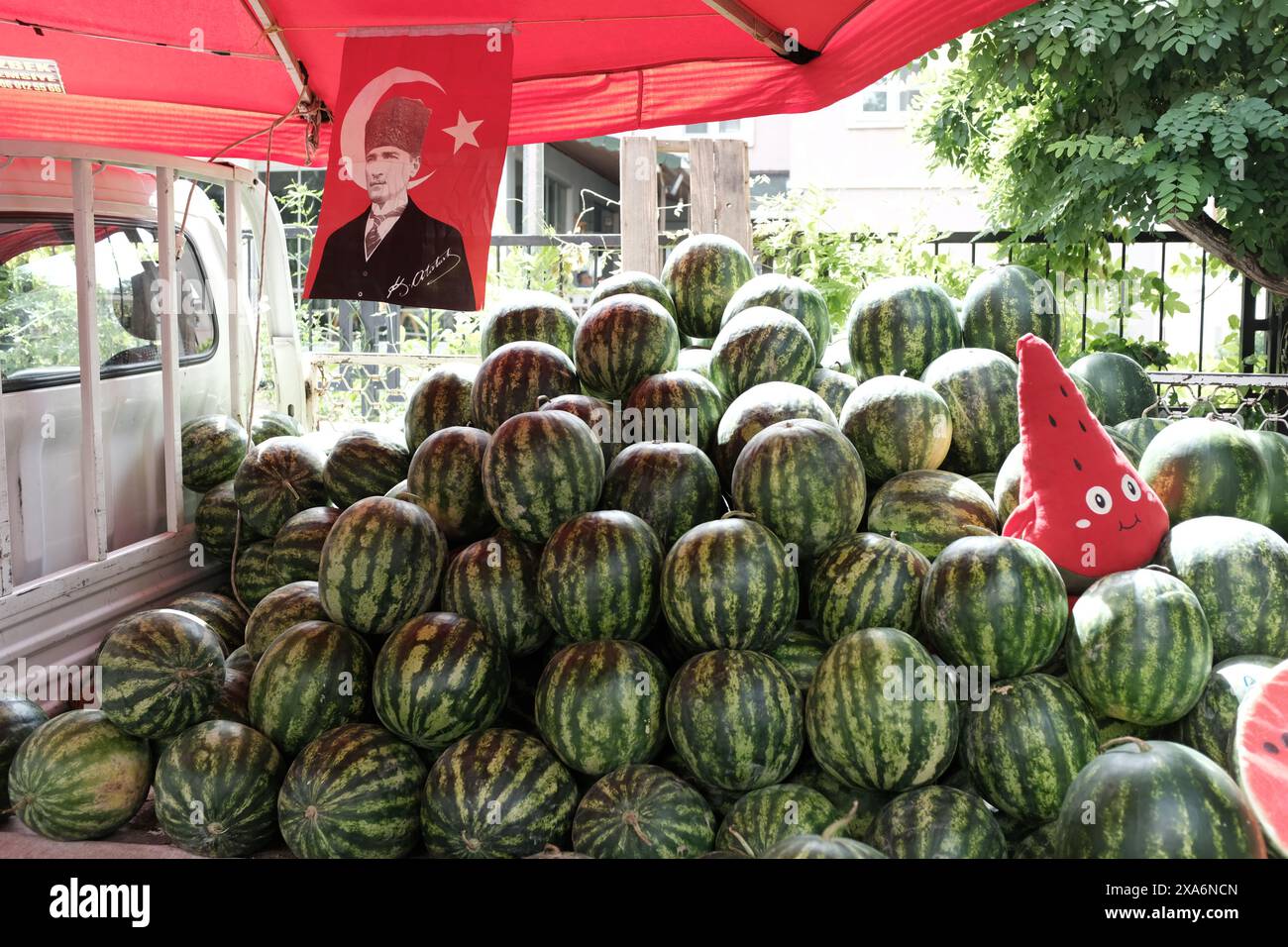 A stack of watermelons under an umbrella in Selcuk, Turkey Stock Photo ...