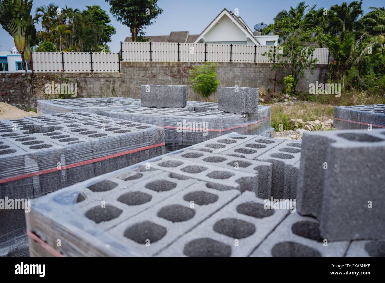 Concrete blocks with holes stacked on top of each other Stock Photo - Alamy