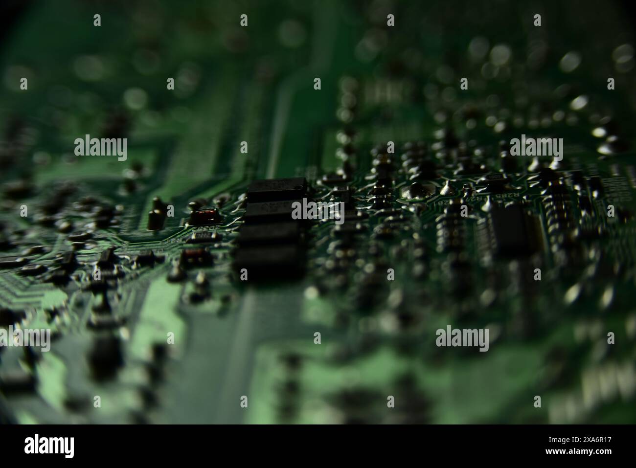 A close-up of a computer motherboard with visible circuitry and ...