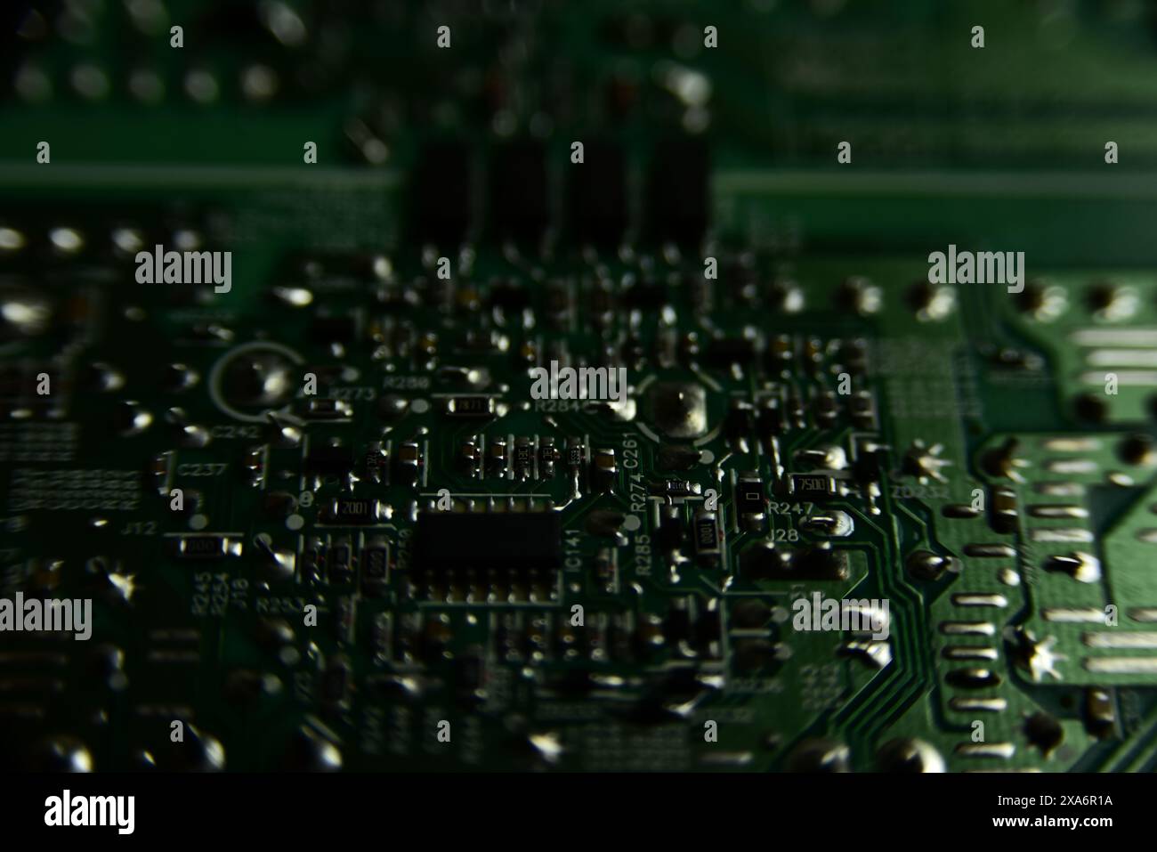 A close-up of a computer motherboard with visible circuitry and ...