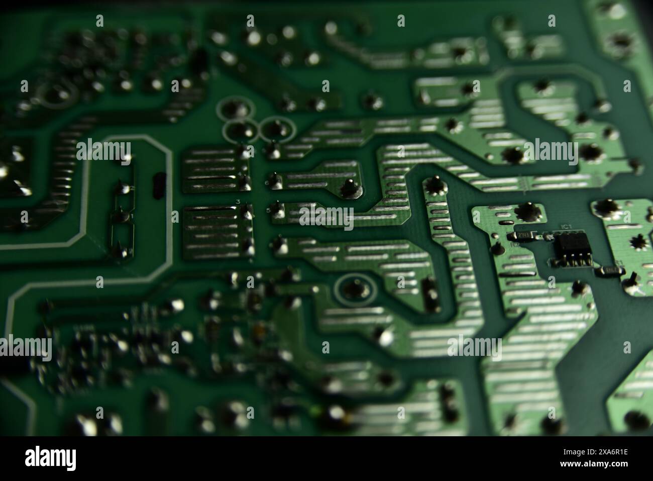 A close-up of a computer motherboard with visible circuitry and ...