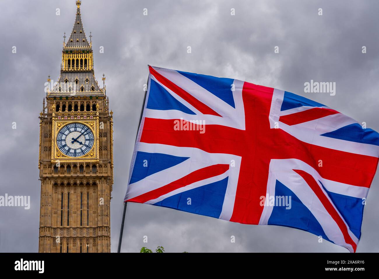 A Union Flag (aka Union Jack) Flying Next To Big Ben (aka Queen ...