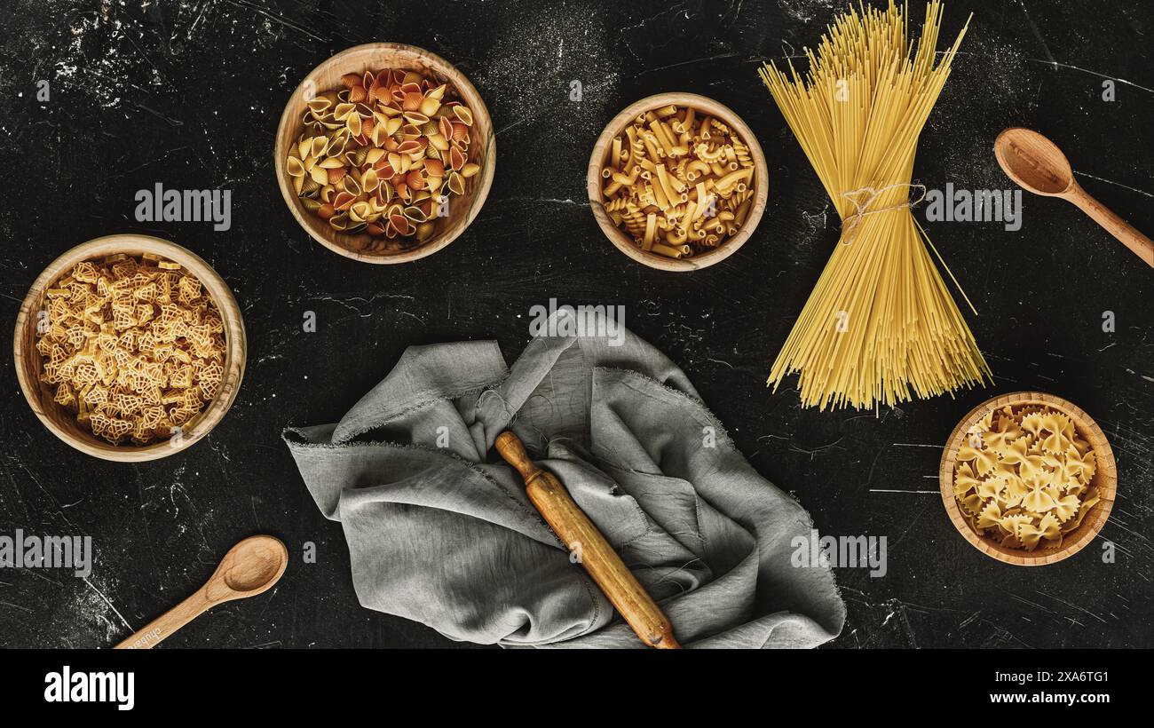 A top view of various pasta types in bowls Stock Photo - Alamy