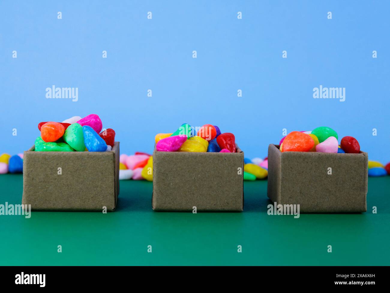 Three cardboard boxes where colorful stones are collected Stock Photo ...