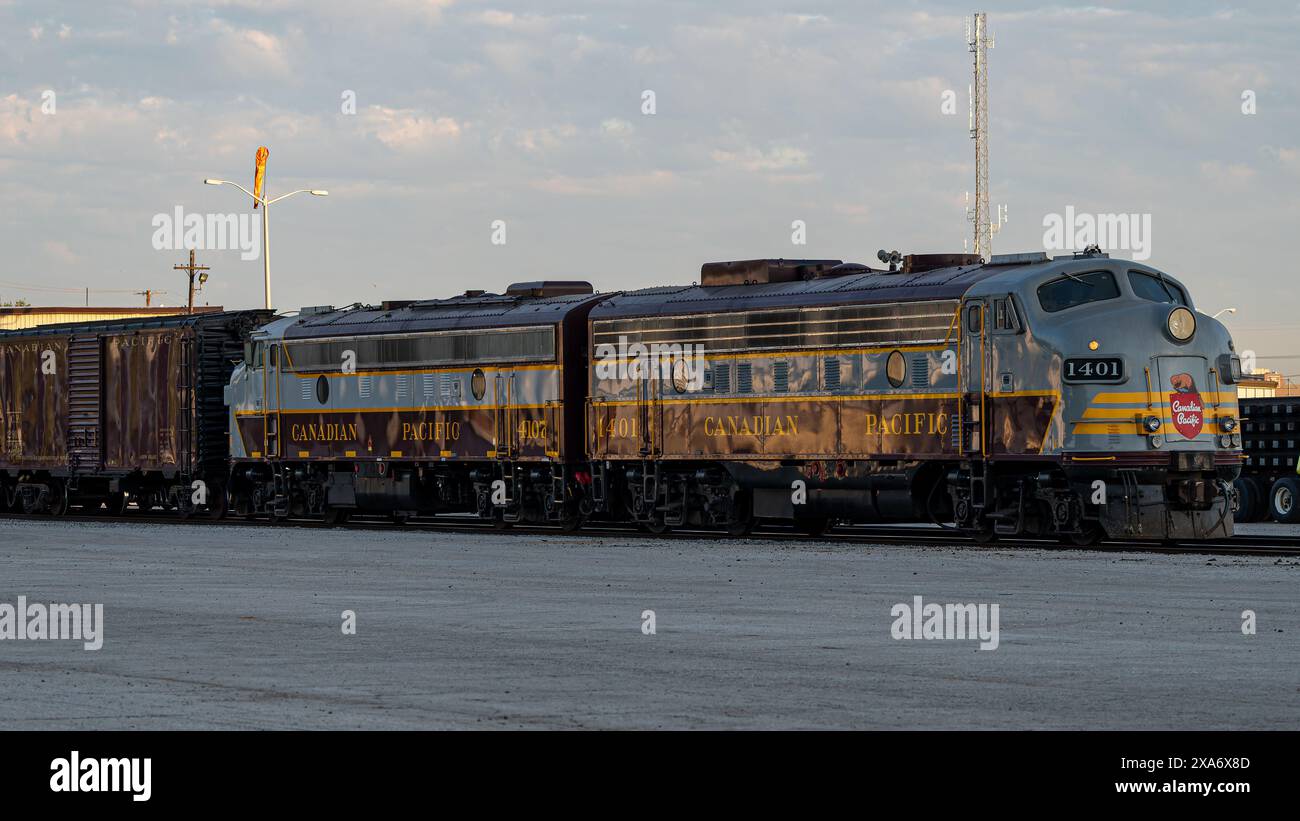 A train moving on tracks with sky background Stock Photo - Alamy