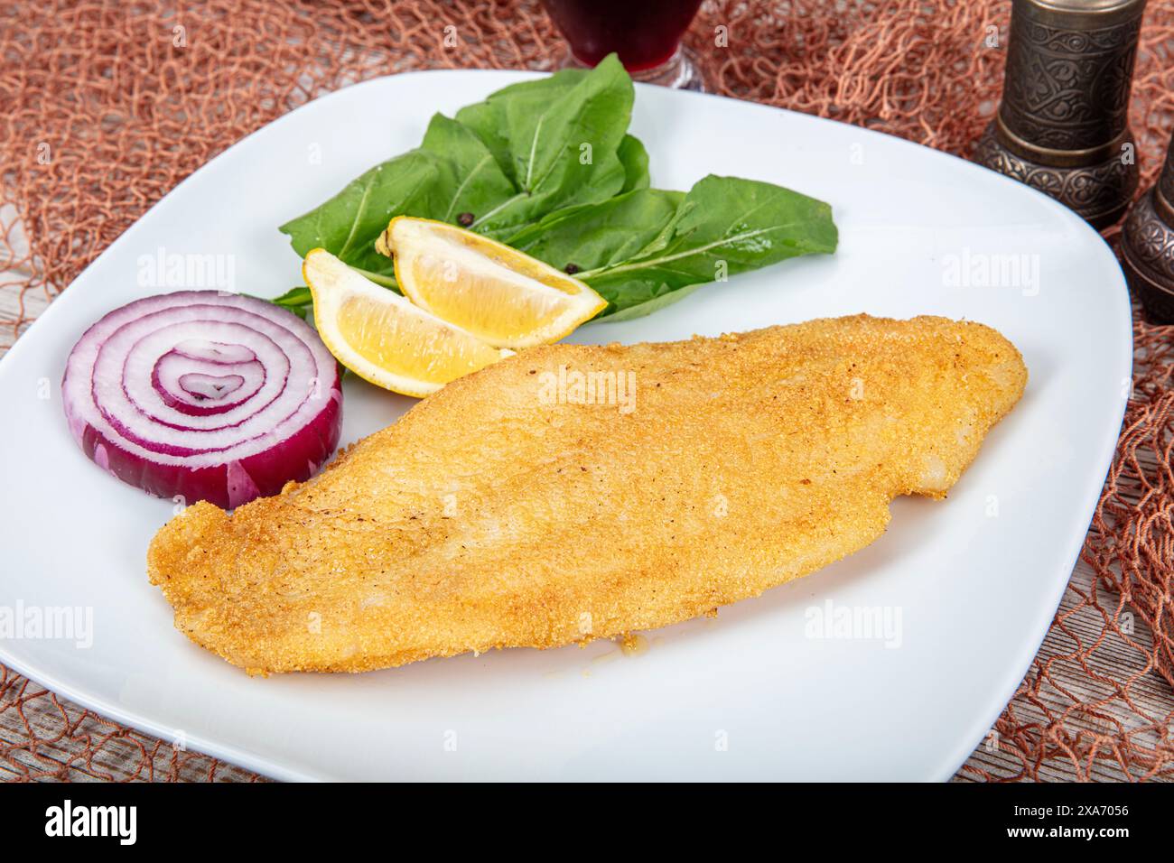 Fried salmon with corn tortillas flavored with cornmeal. Pieces of ...