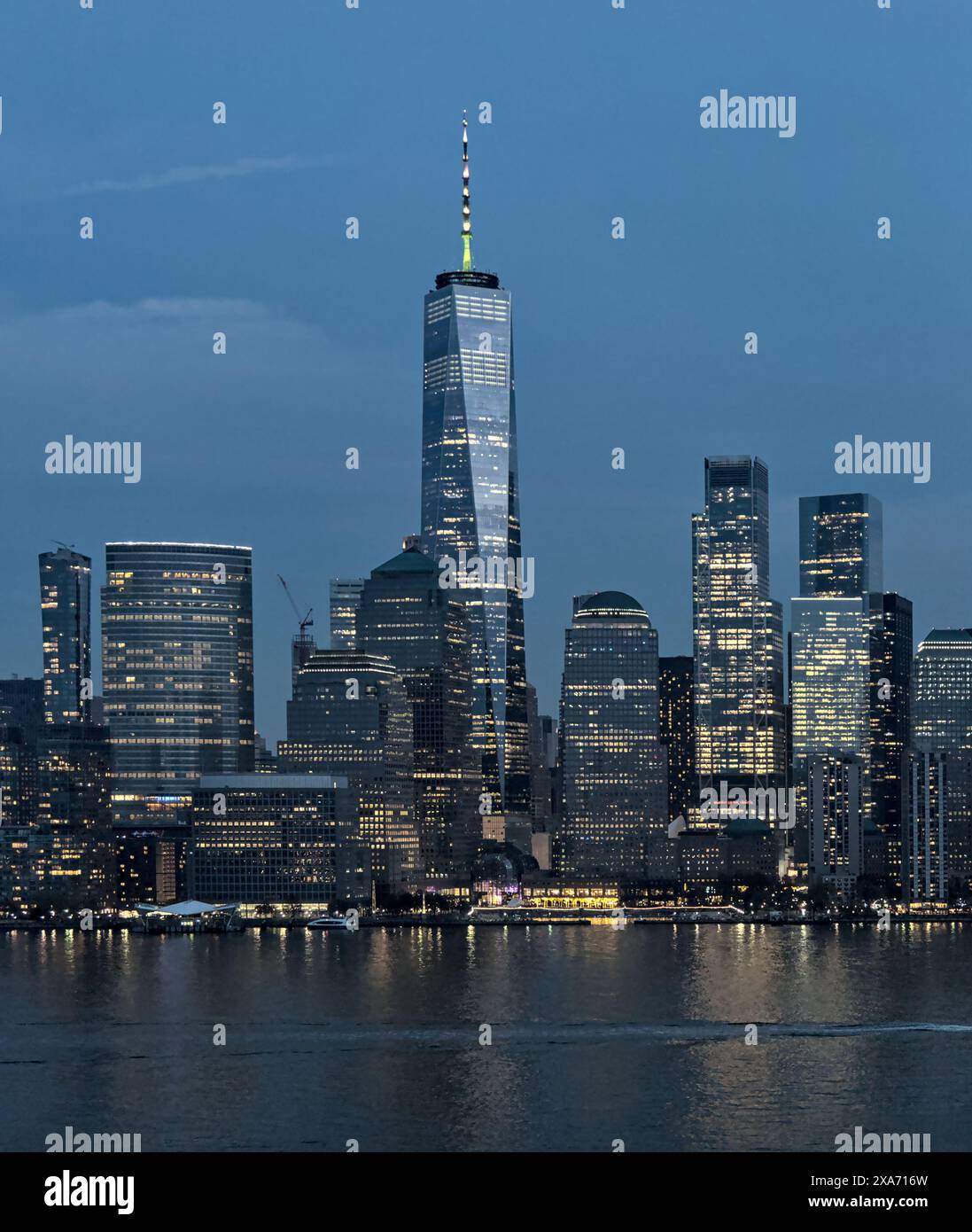 wooden bench on rooftop leading to view of downtown nyc (one world ...