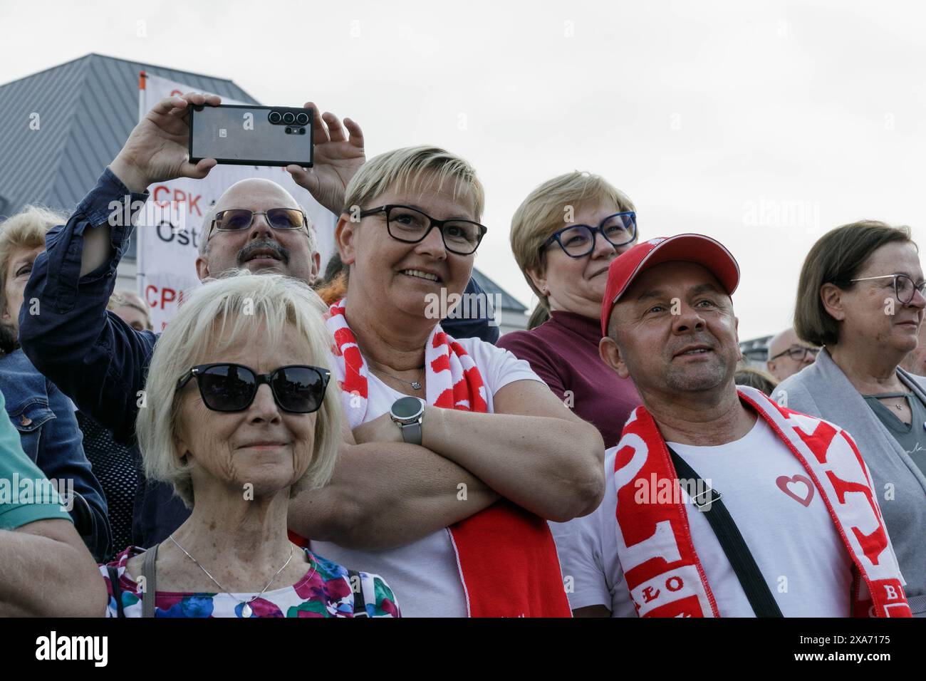 People listen to Donald Tusk's speech during the rally, organized by ...