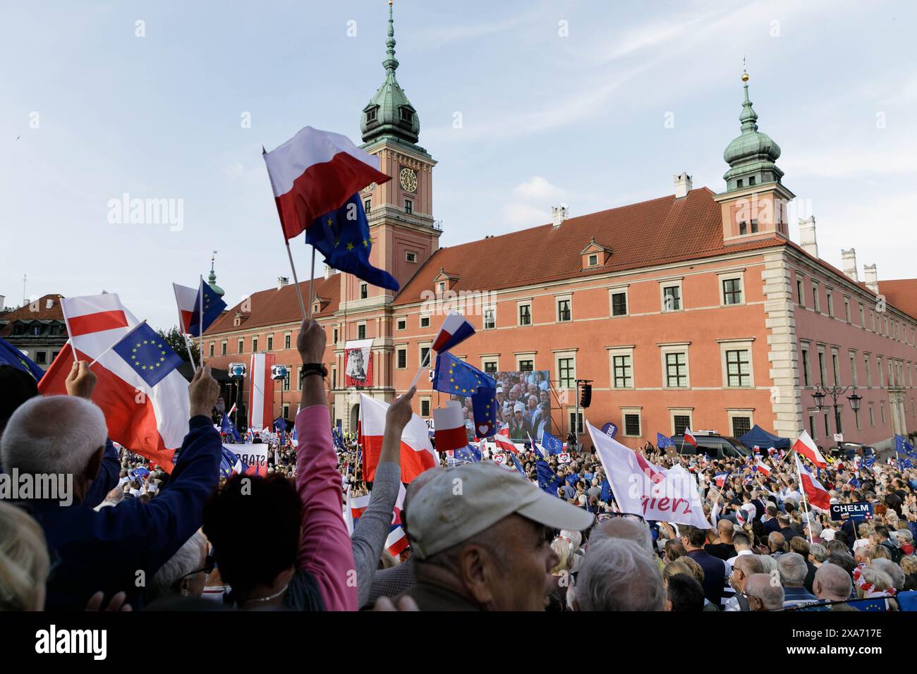 People wave Polish and European Union flags during the rally, organized ...