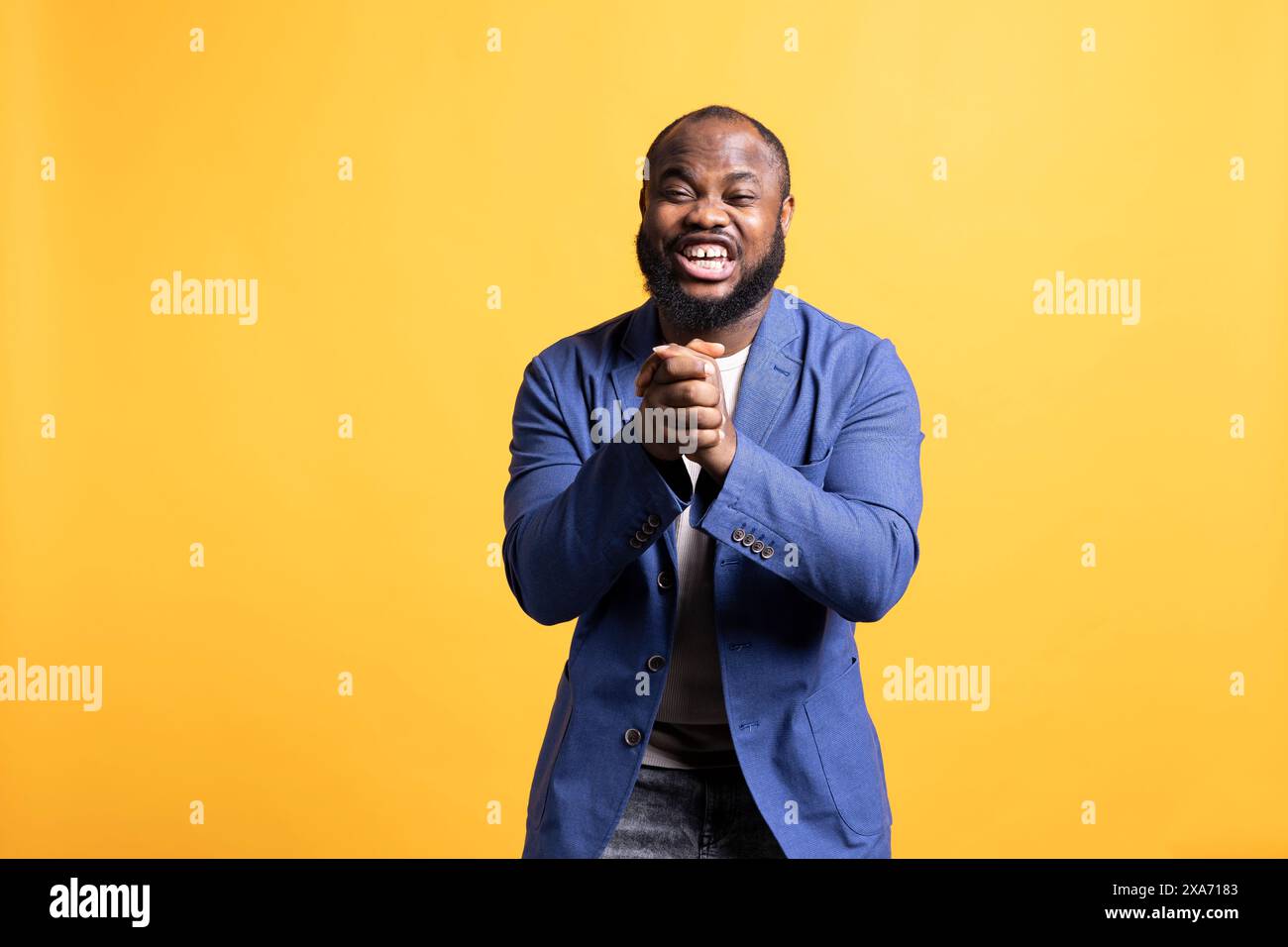 Portrait of overjoyed african american man laughing hard, amused by ...