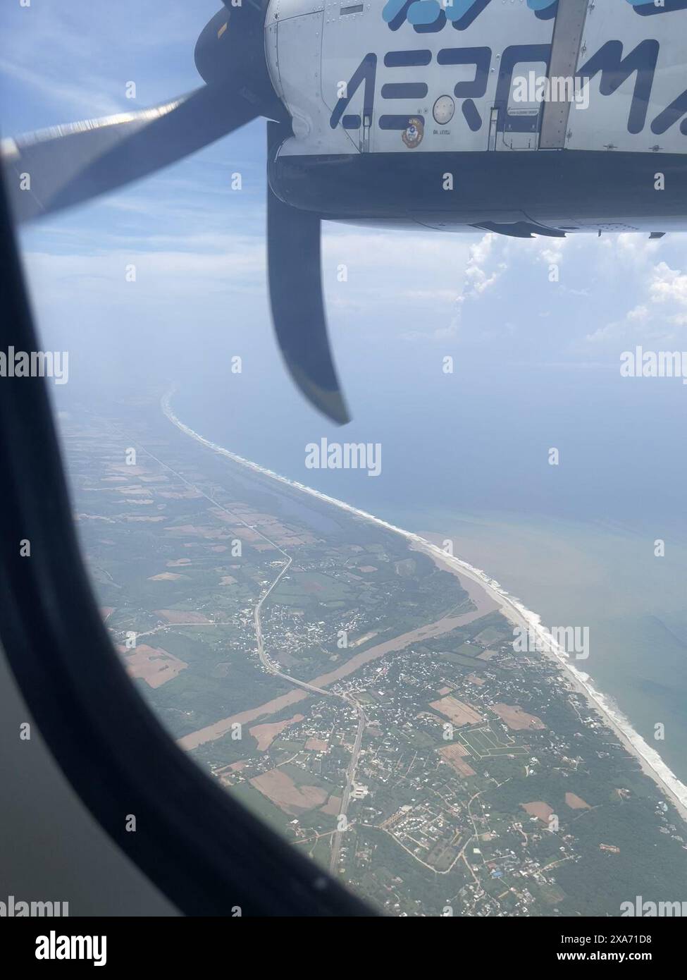 Plane flying over the Caribbean beaches in Puerto Escondido Oaxaca ...