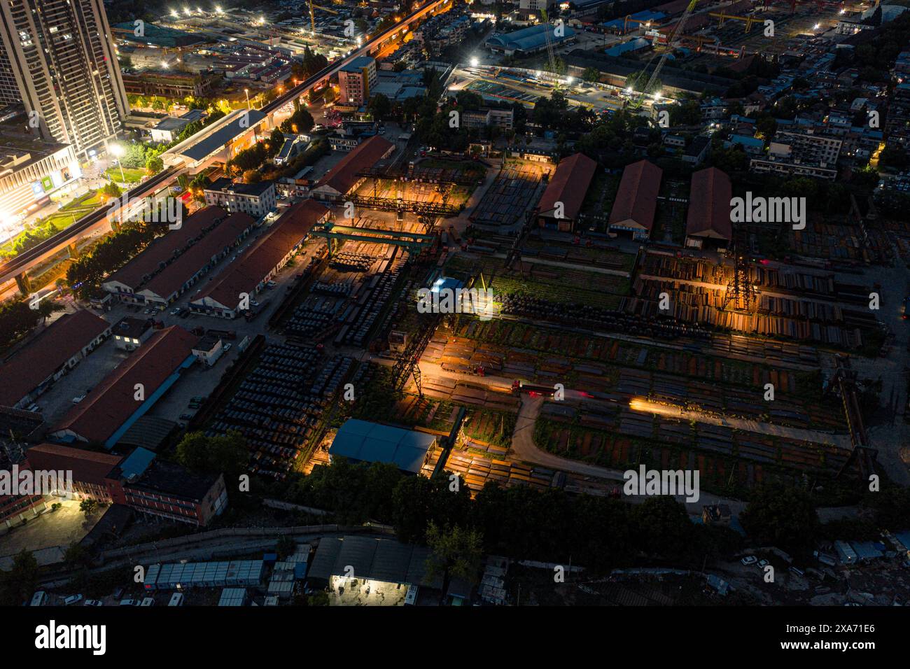 A Night aerial photo of Wuhan Steel Trading Market. Starry lights lit ...