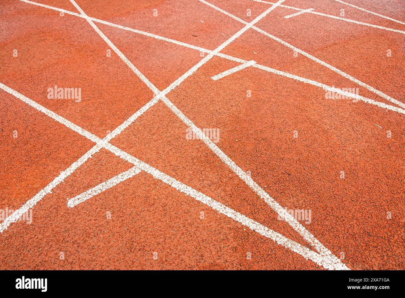 The bright red runway interweaves the straight white trajectory with ...