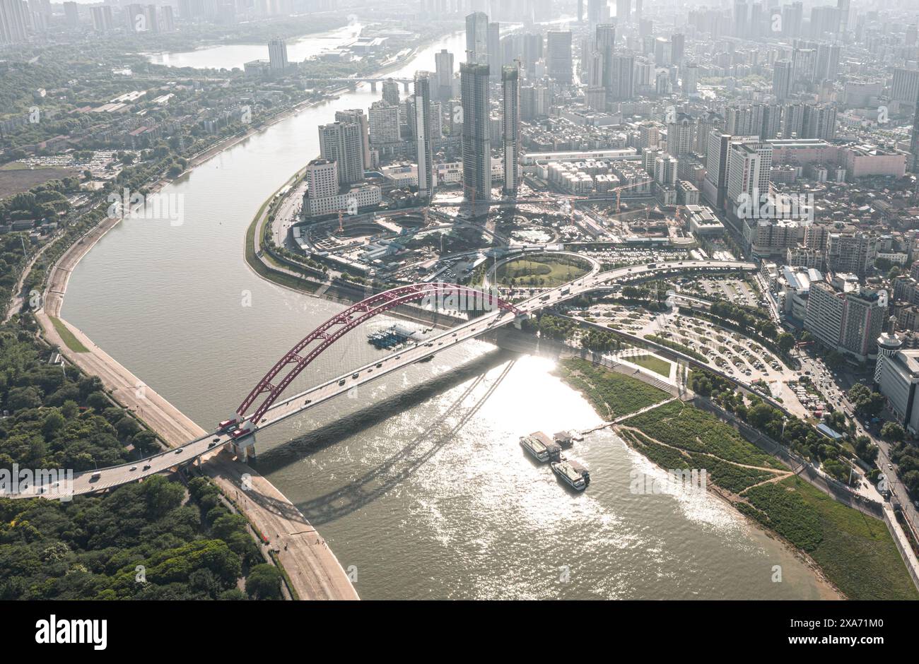 The city of Wuhan, red bridges connect both sides of the Han River, and ...