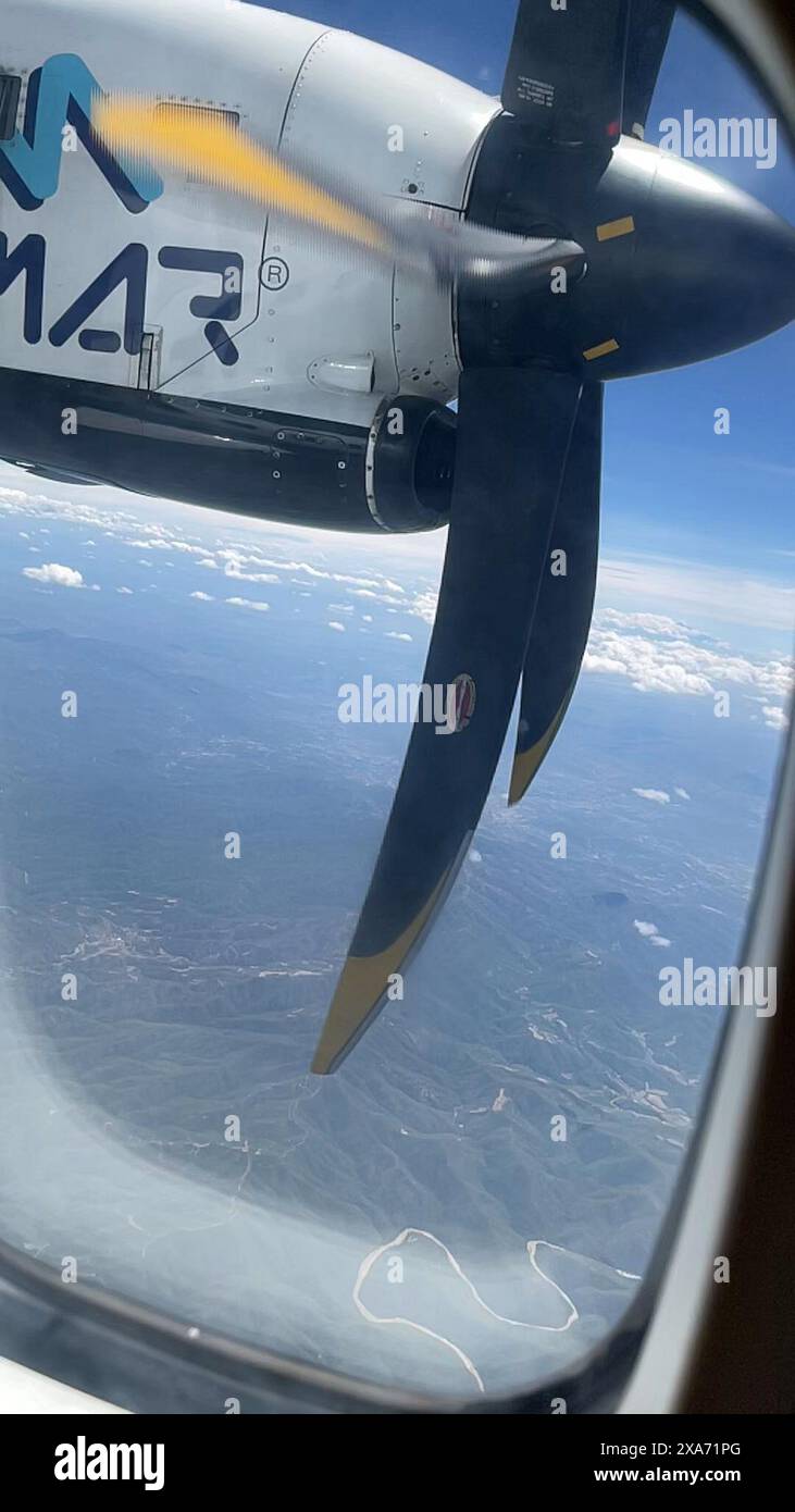 Plane flying over the Caribbean beaches in Puerto Escondido Oaxaca ...