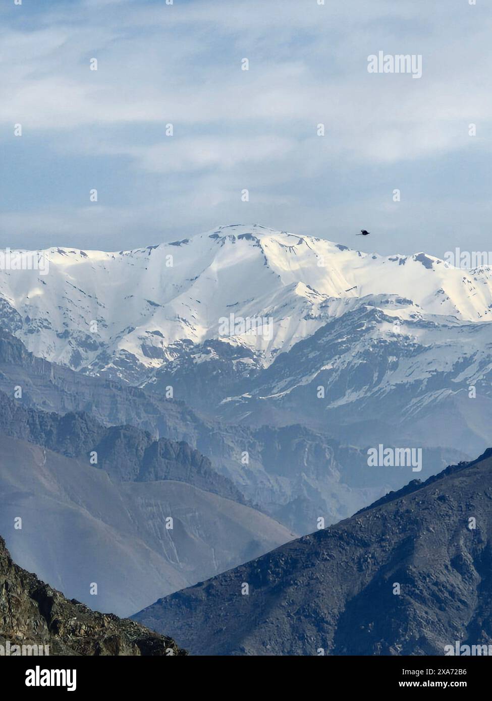 The bug mountains with snow-covered peaks under the blue sky Stock ...