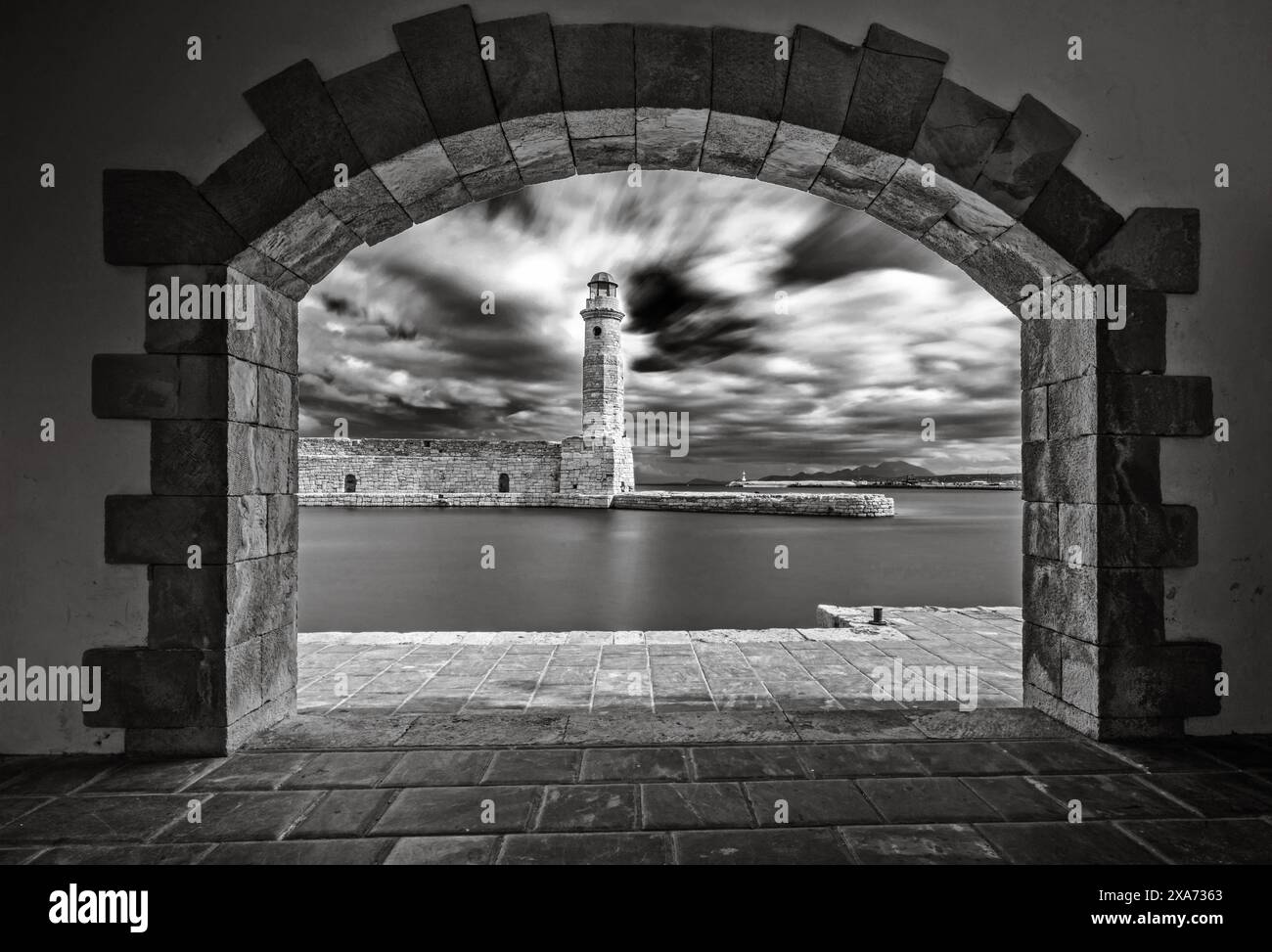 A monochrome image of a lighthouse in a watery setting Stock Photo - Alamy
