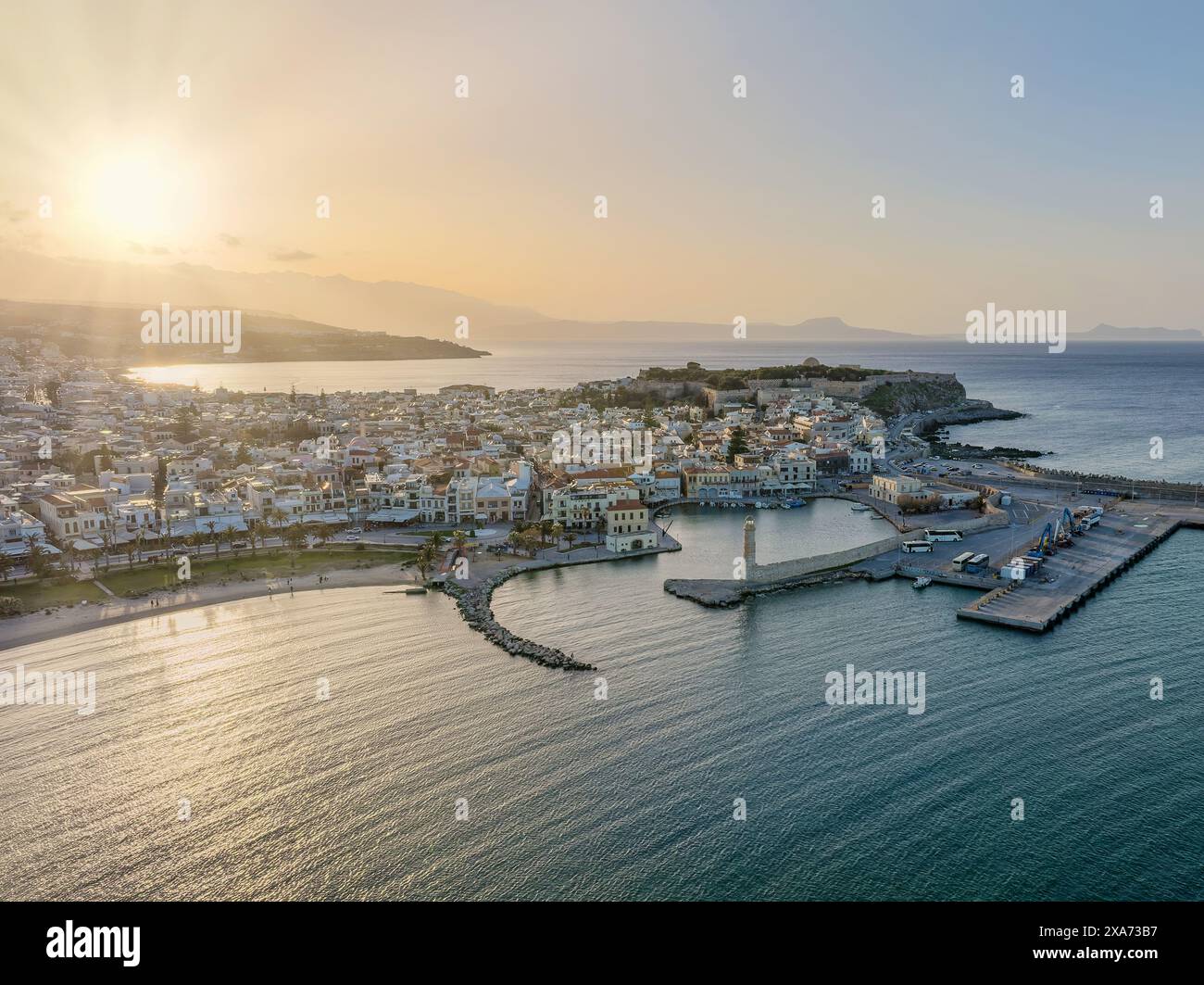 Aerial view of a small marina and town at sunset Stock Photo - Alamy
