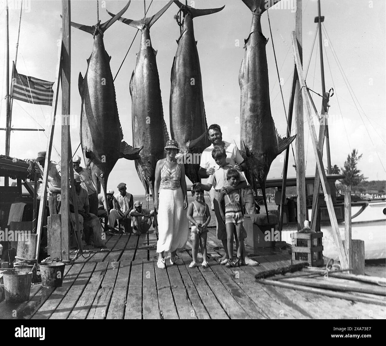 Pauline, Patrick, Ernest, John, and Gregory Hemingway with four marlins ...