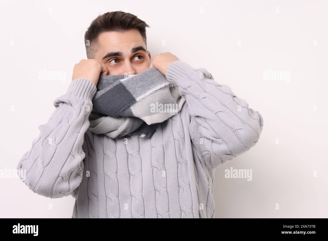 Man hiding in warm hi-res stock photography and images - Alamy