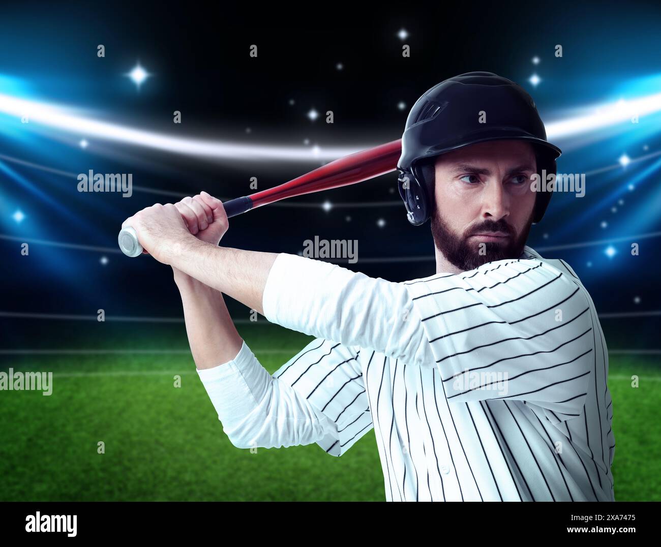 Professional baseball player with bat on stadium Stock Photo - Alamy