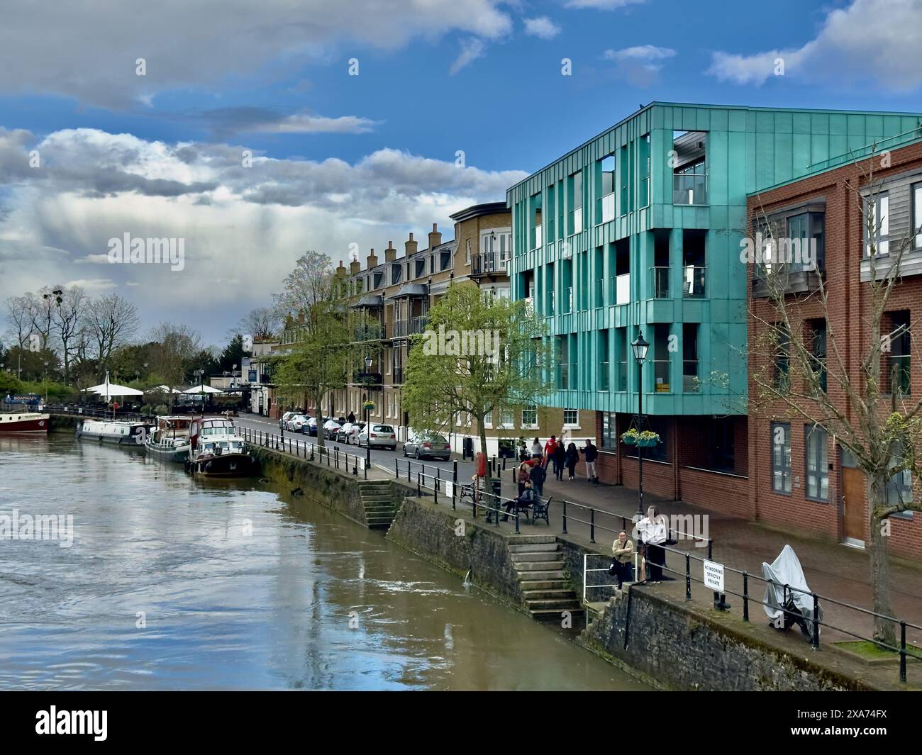 Canal in a suburban neighborhood with rising water levels Stock Photo ...