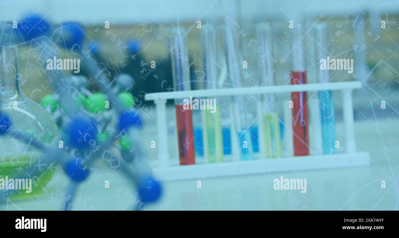 Image of mathematical and scientific formulas over chemistry laboratory ...