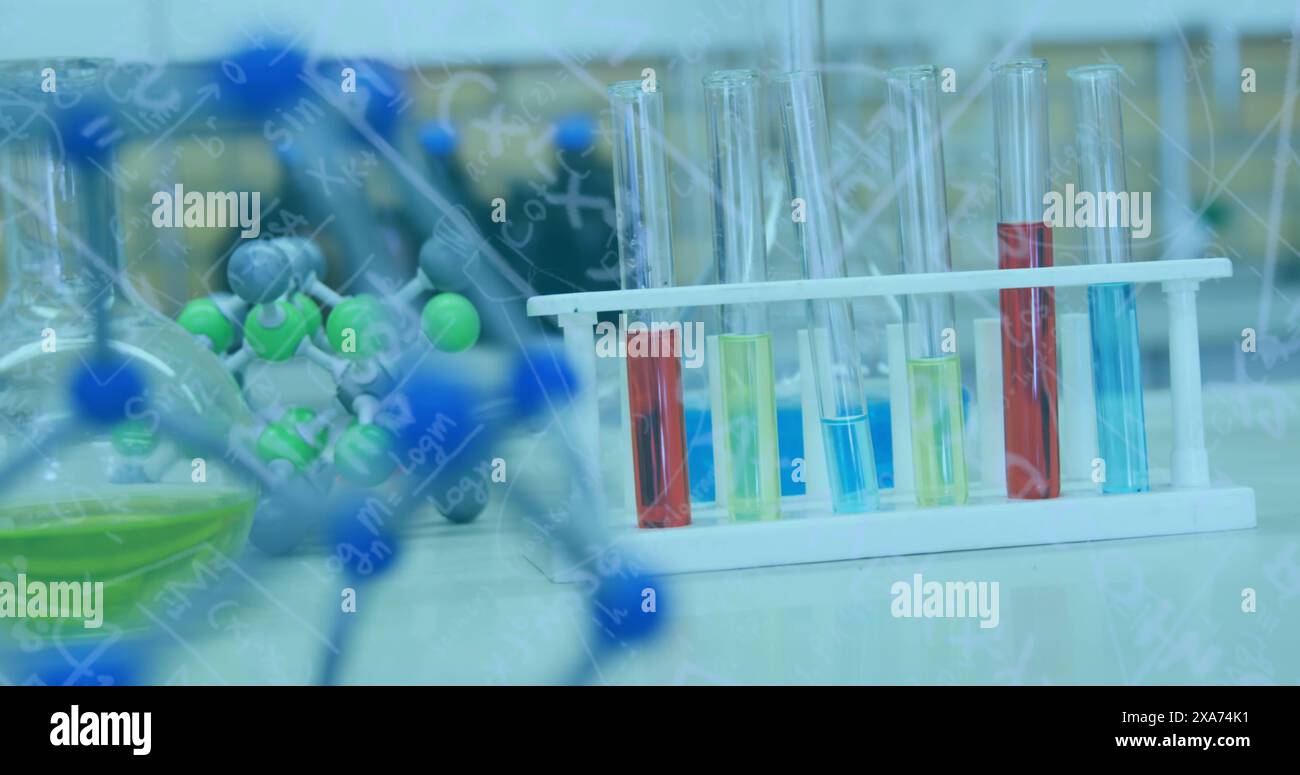 Image of mathematical and scientific formulas over chemistry laboratory ...