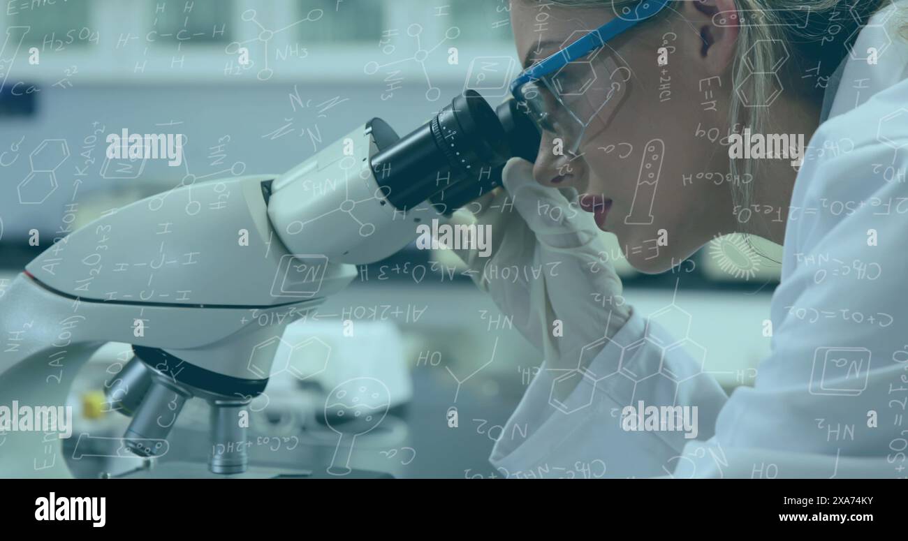 Female scientist working microscope hi-res stock photography and images ...