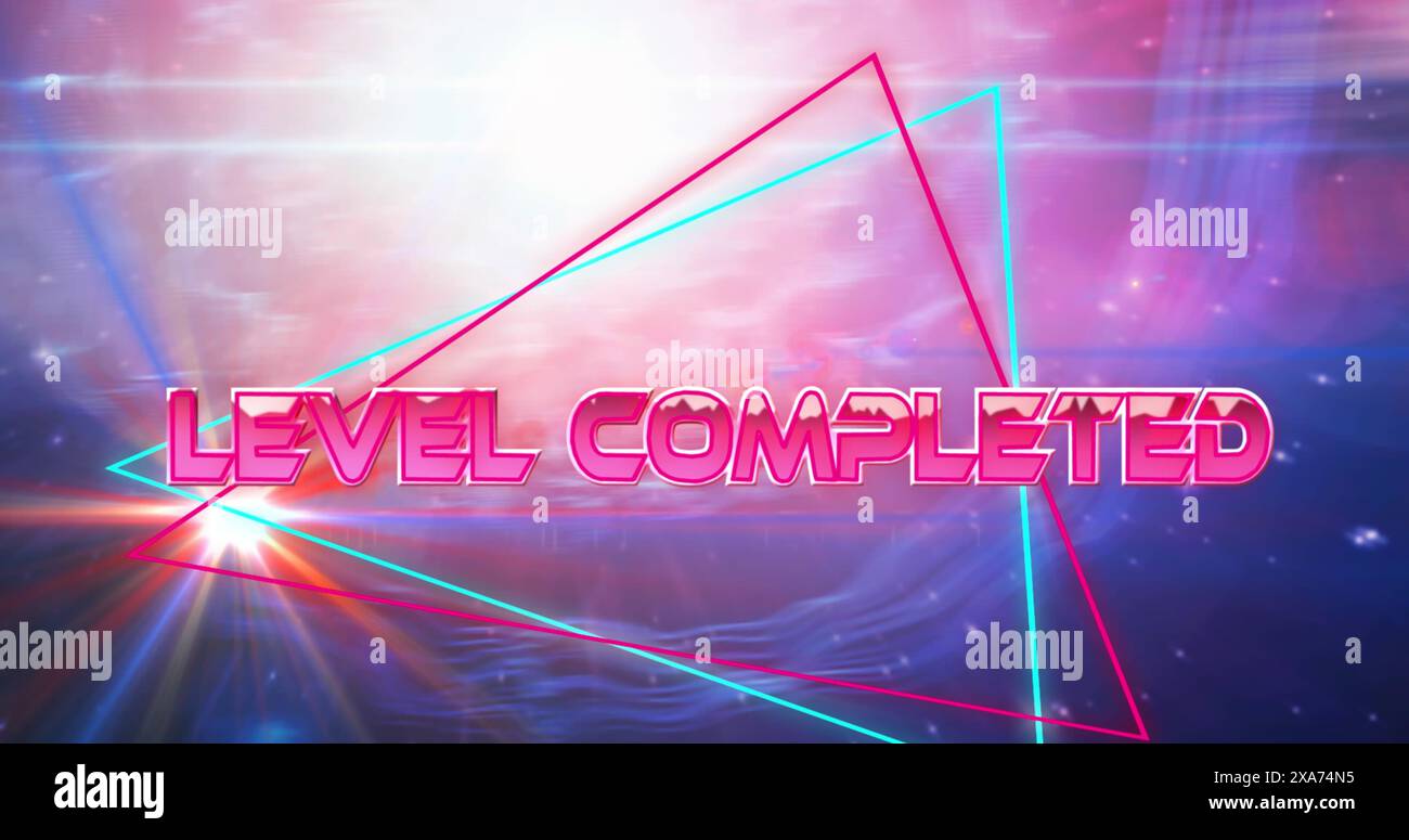 Image of level completed text in metallic letters on pink and blue ...