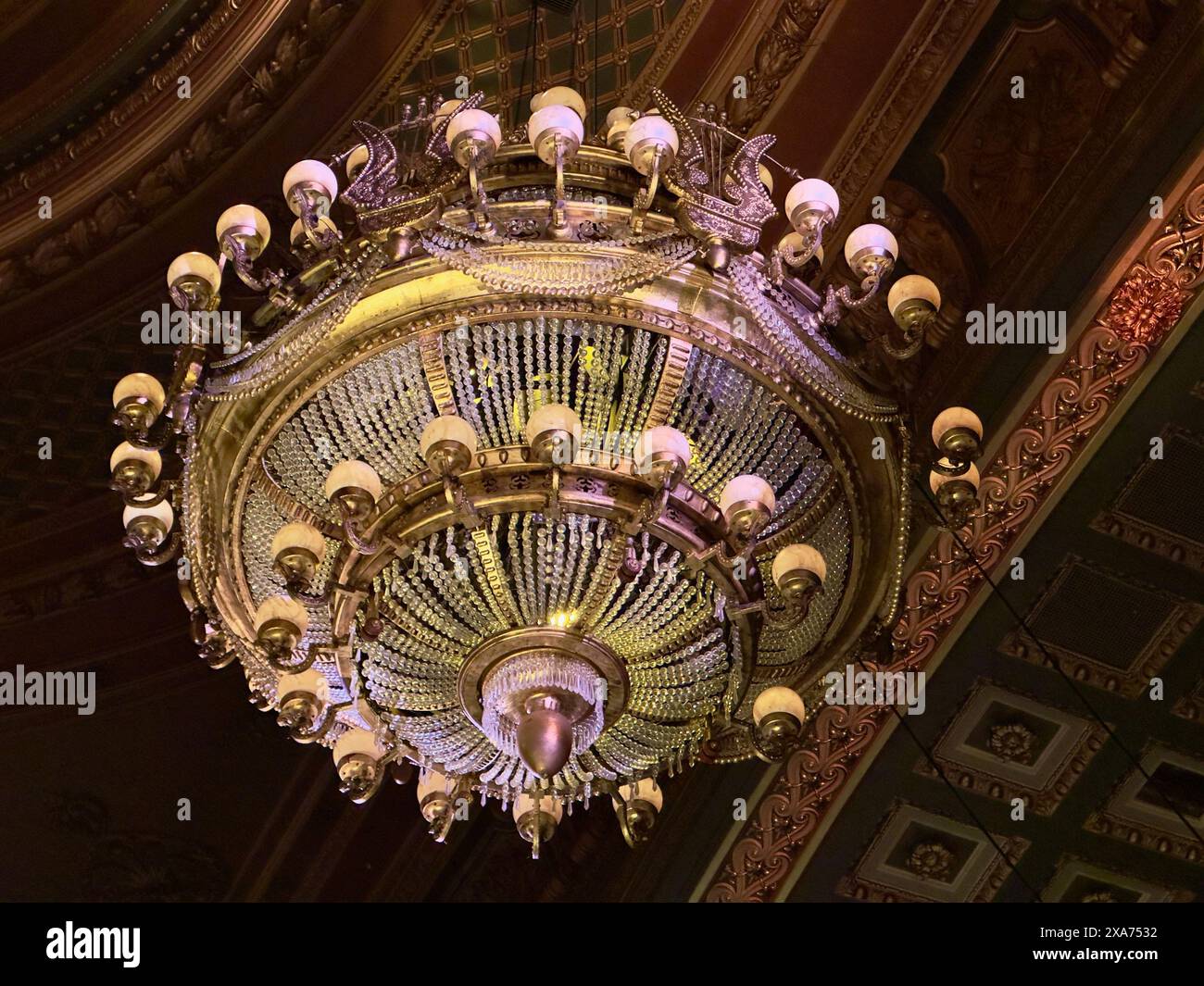 Elegant lights hang from church ceiling Stock Photo - Alamy