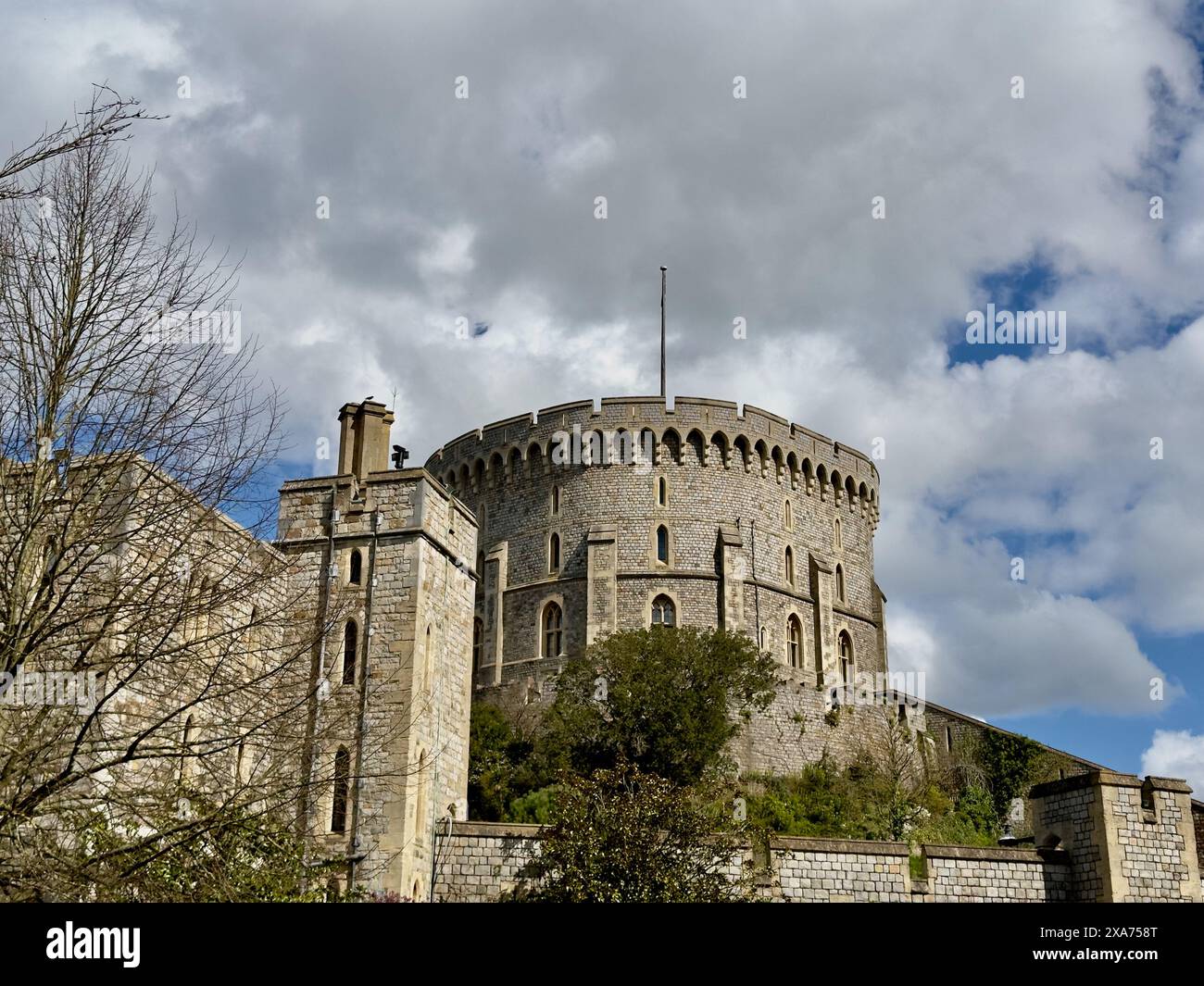 A clock tower in a grand castle-like building Stock Photo - Alamy