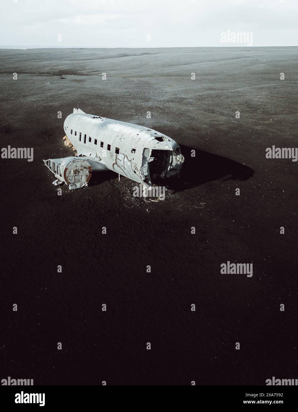 The wreck of the DC-3, abandoned for decades on the black sand beach of ...