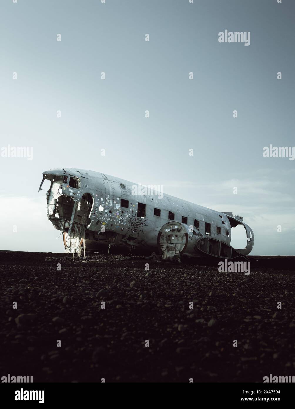 The wreck of the DC-3, abandoned for decades on the black sand beach of ...