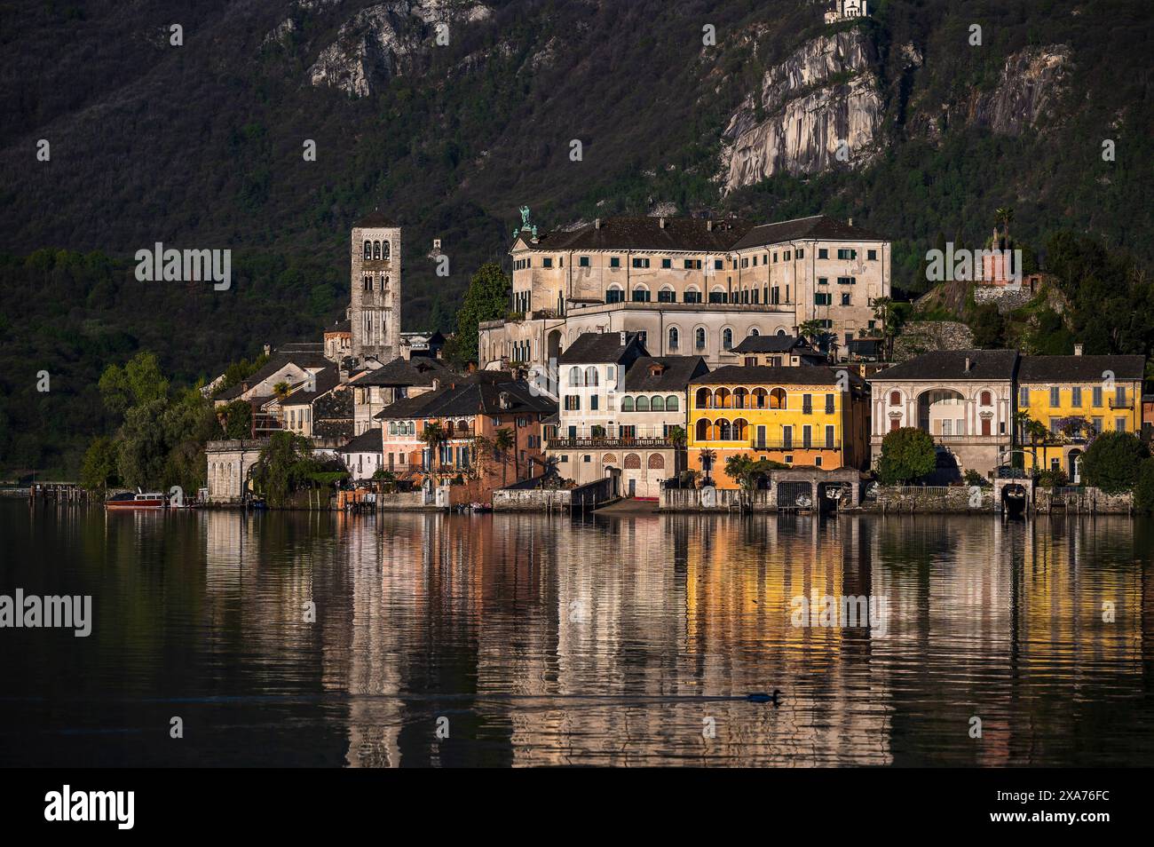 View of Isola San Giulio from the port of Orta San Giulio, Piazza Motta ...