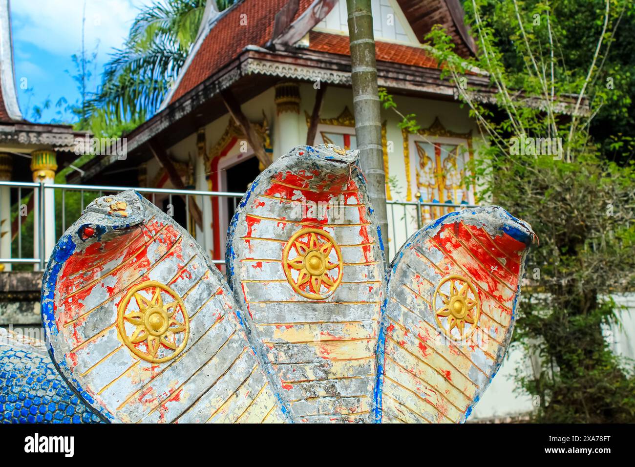 Buddhist temple Wat Kaew Manee Si Mahathat at sunny day in Phang Nga, Thailand, vertical ...