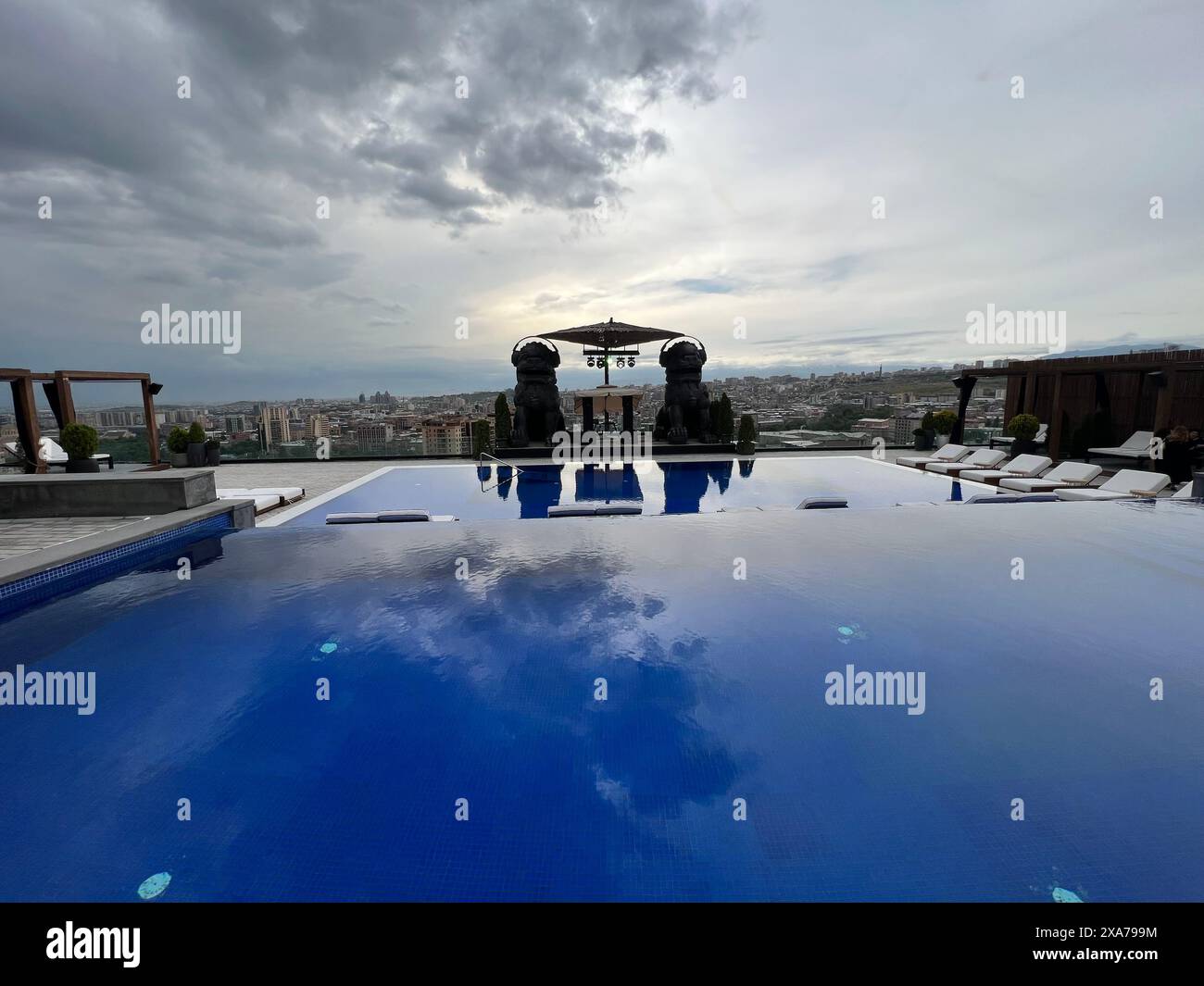 View swimming pool deckchairs hi-res stock photography and images - Alamy
