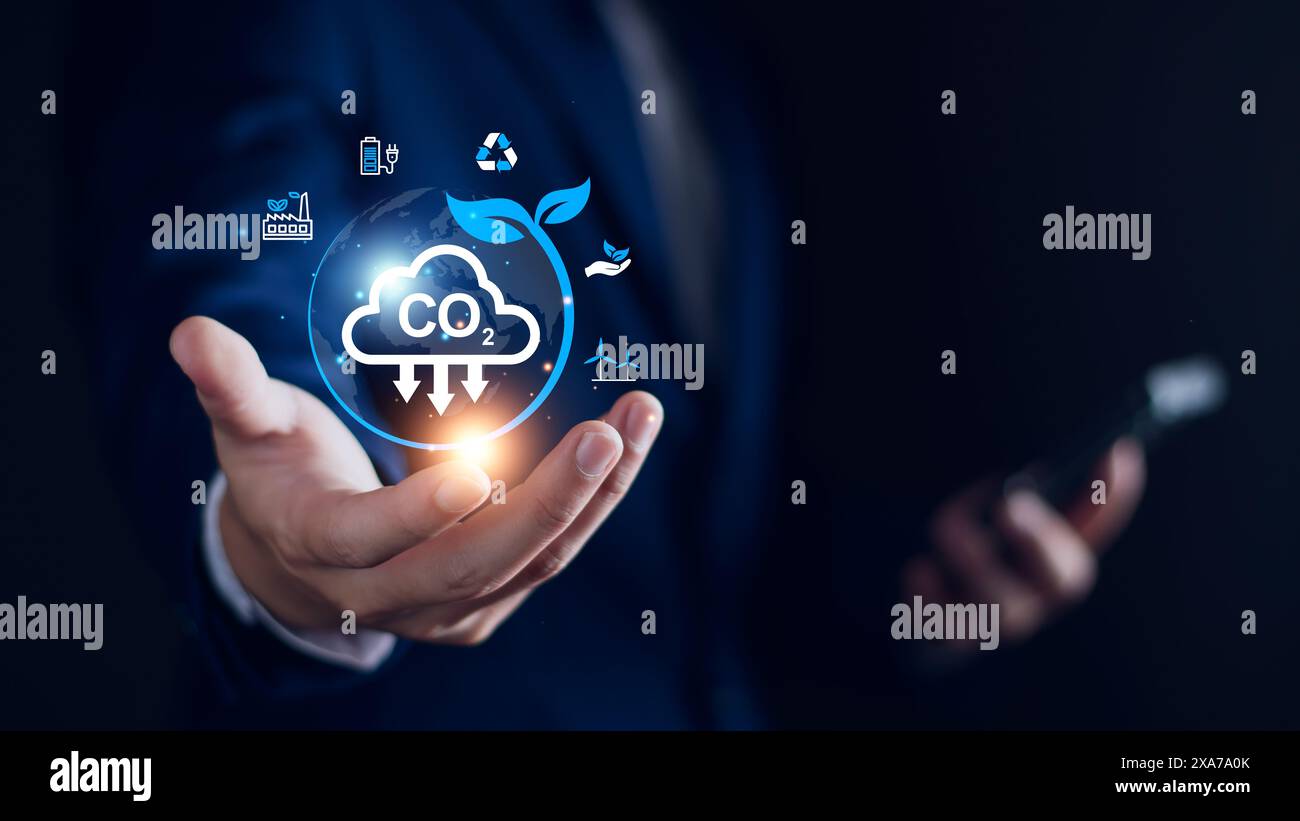 CO2 Carbon dioxide emission reduction, businessman and environmental ...