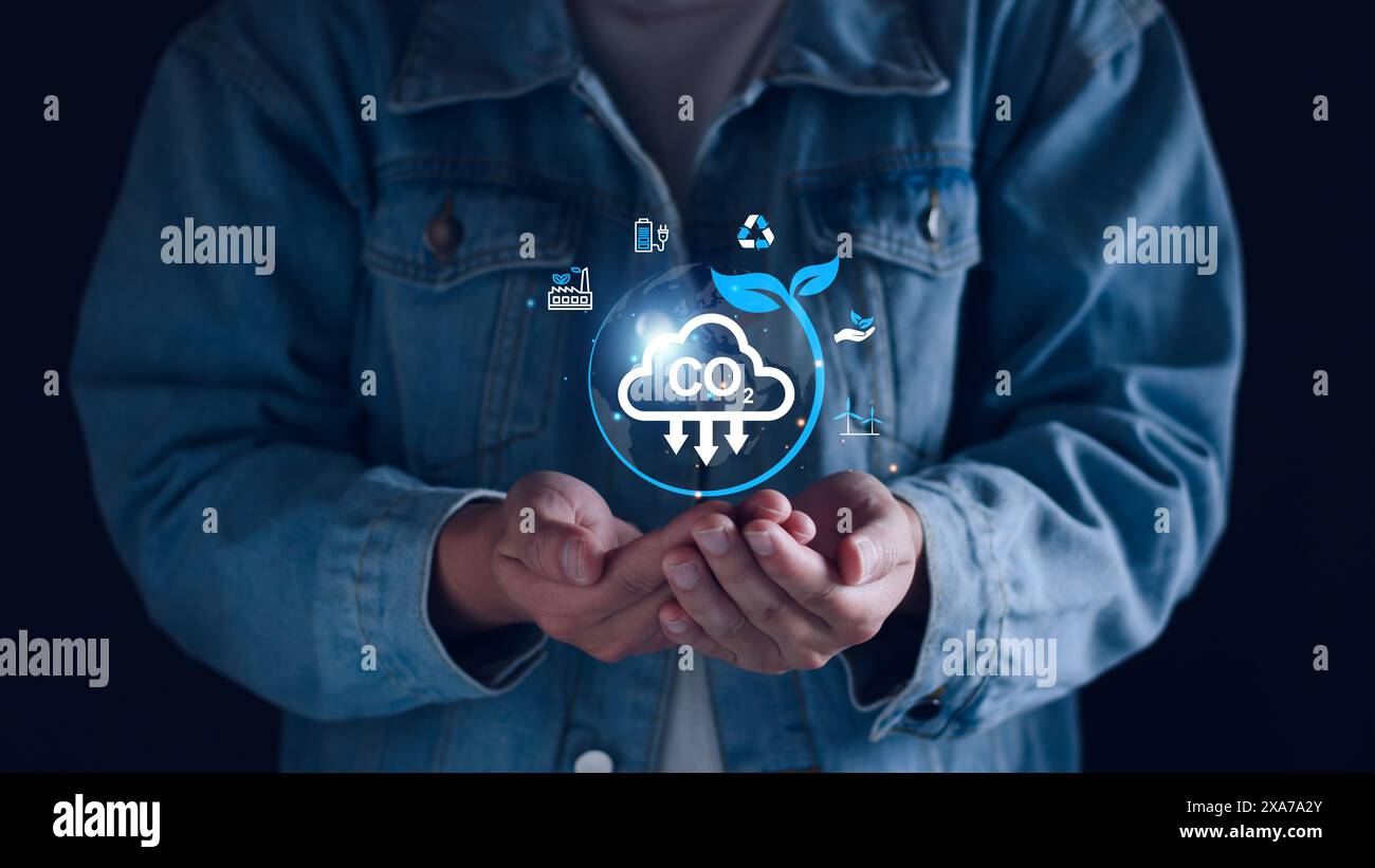 CO2 Carbon dioxide emission reduction, businessman and environmental ...