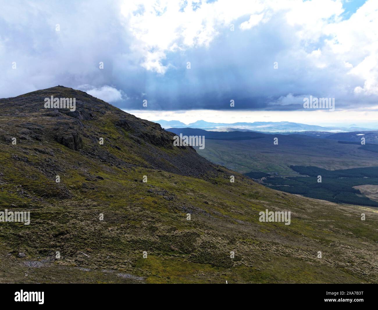 A beautiful landscape of rolling hills and valleys in Arenig Fawr ...