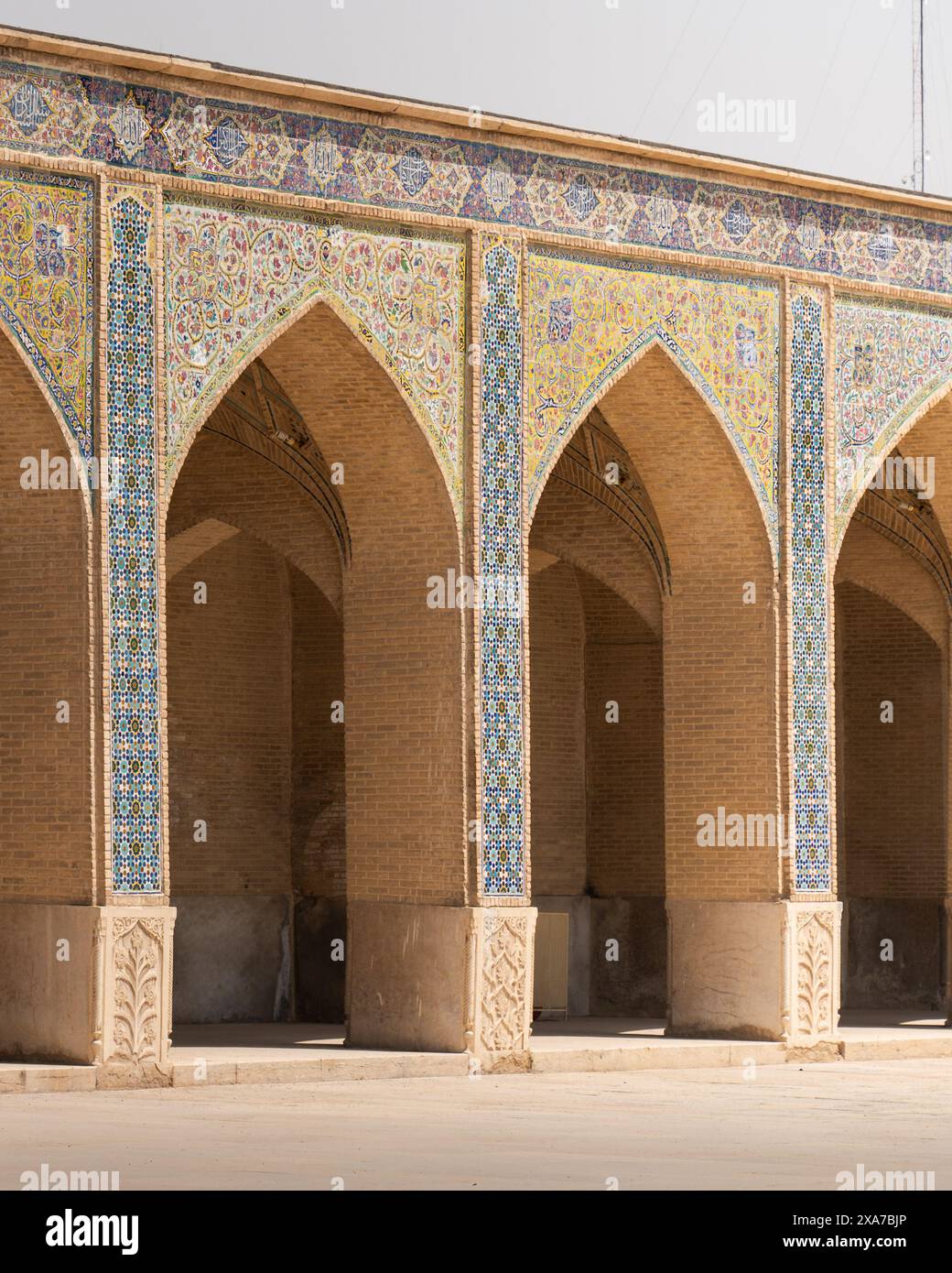 The beautiful Vakil Mosque in Shiraz, Iran with blue and gold tile work ...