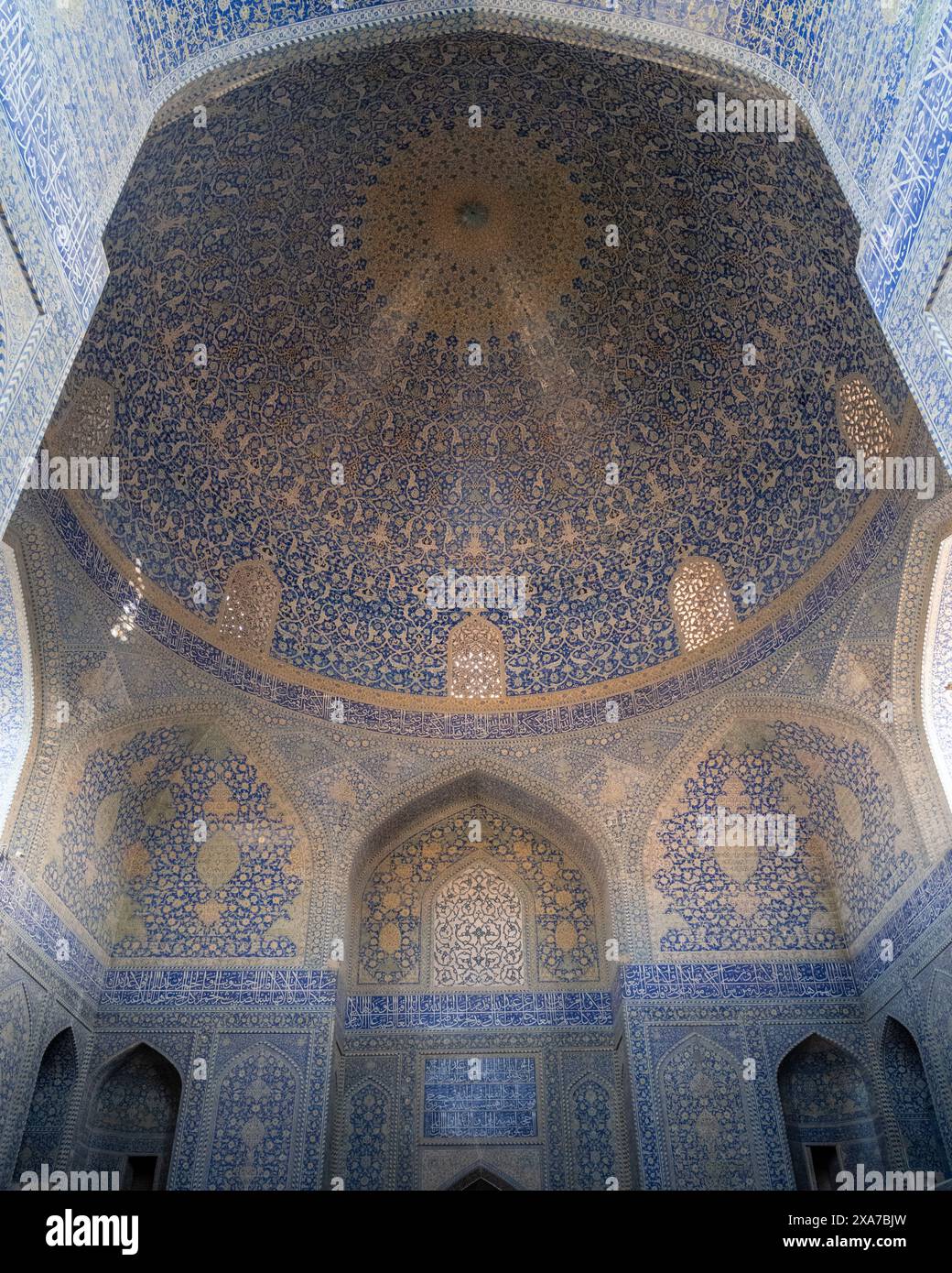 The beautiful Shah Mosque in Isfahan, Iran with blue and gold tile work ...